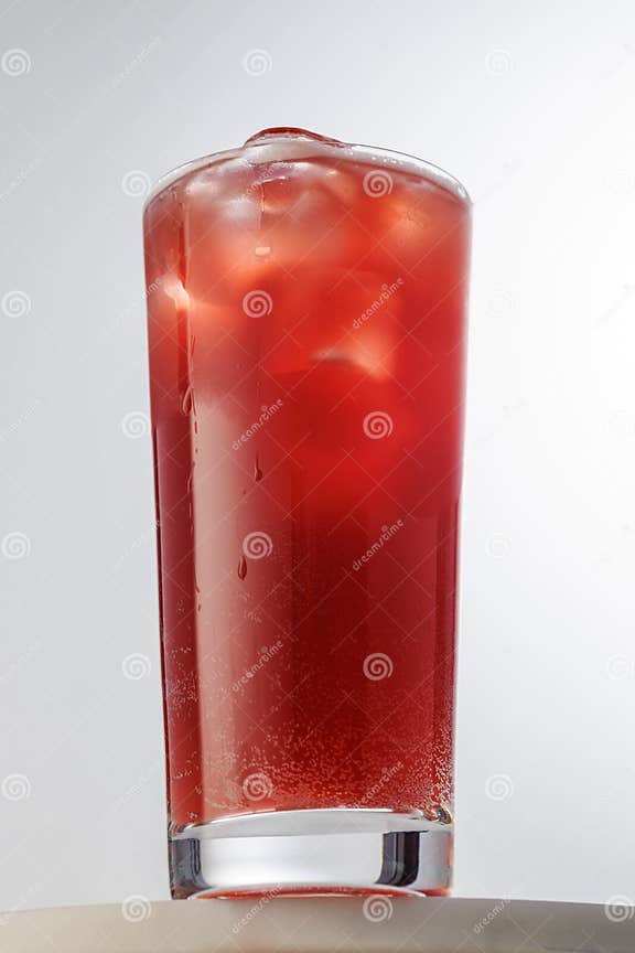Glass of red iced drink stock image. Image of organic - 259933259