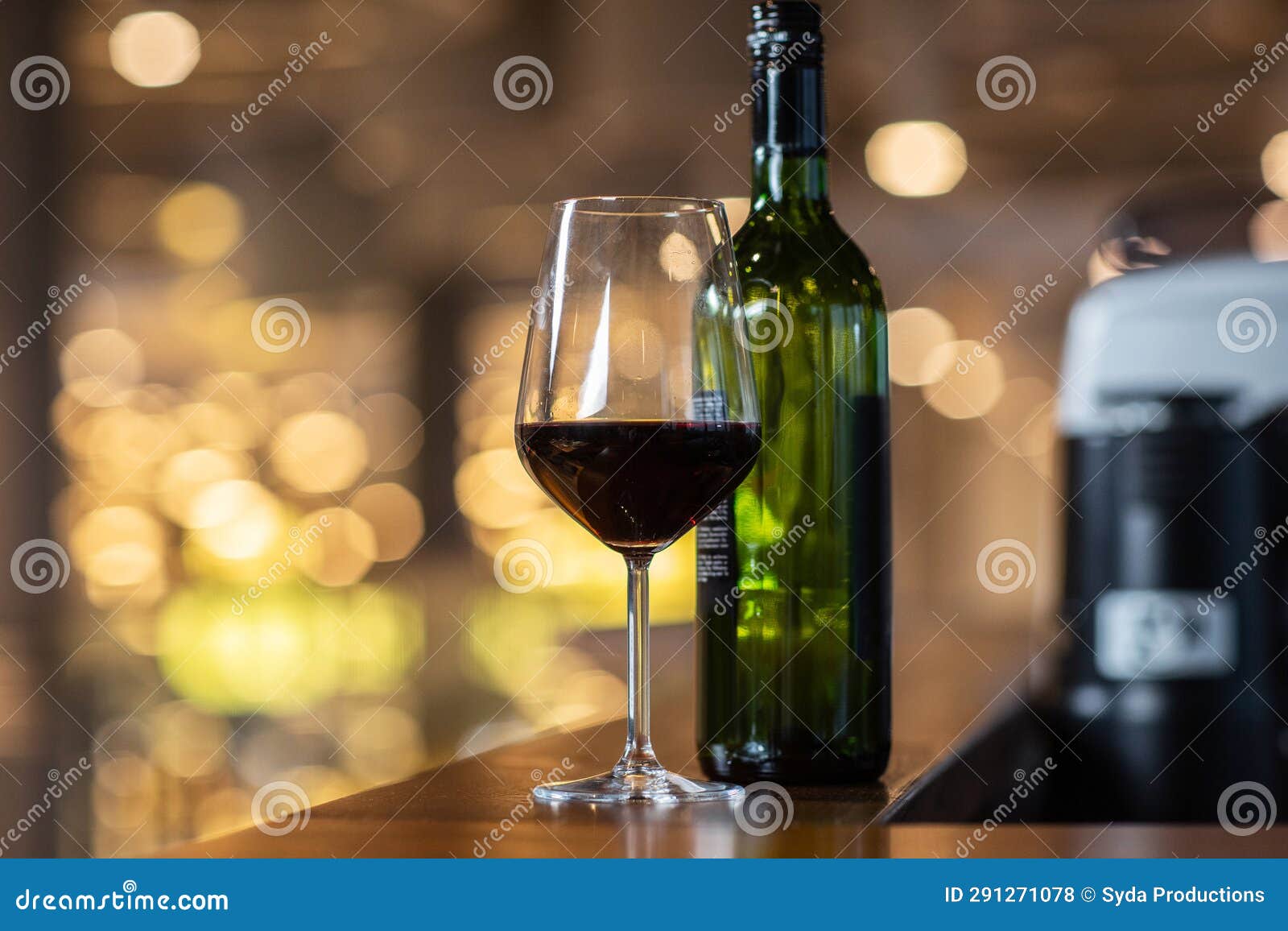 Glass of Red Wine and Bottle at Restaurant Stock Photo - Image of ...