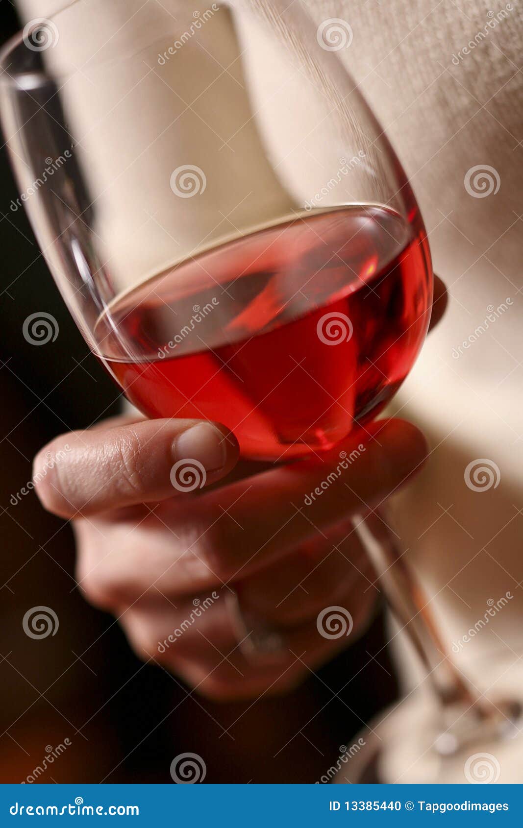 Glass of red wine in hand stock photo. Image of caucasian - 13385440