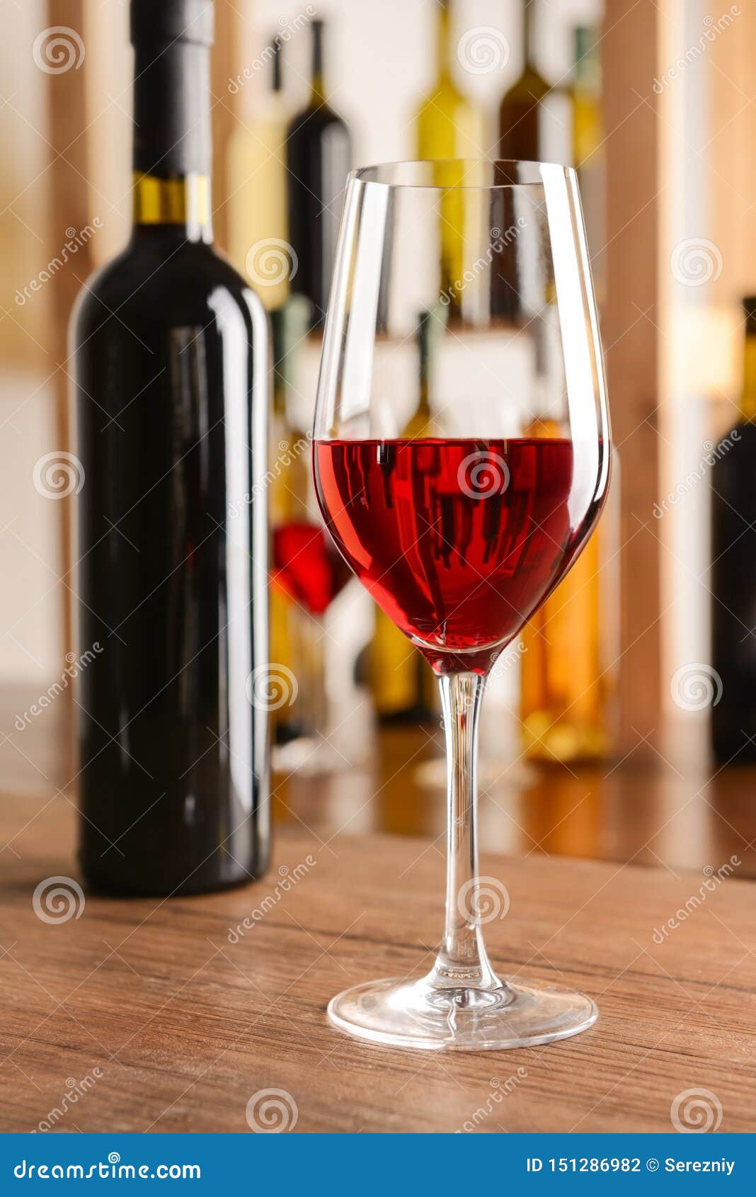 Glass of Red Wine on Wooden Table Stock Photo - Image of glassware ...