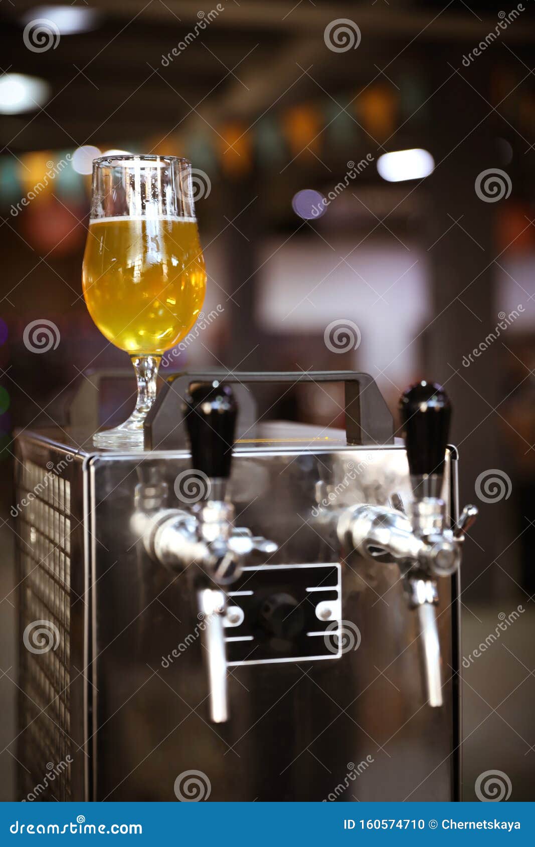 Glass of Refreshing Beer on Cooling Machine Stock Photo - Image of ...