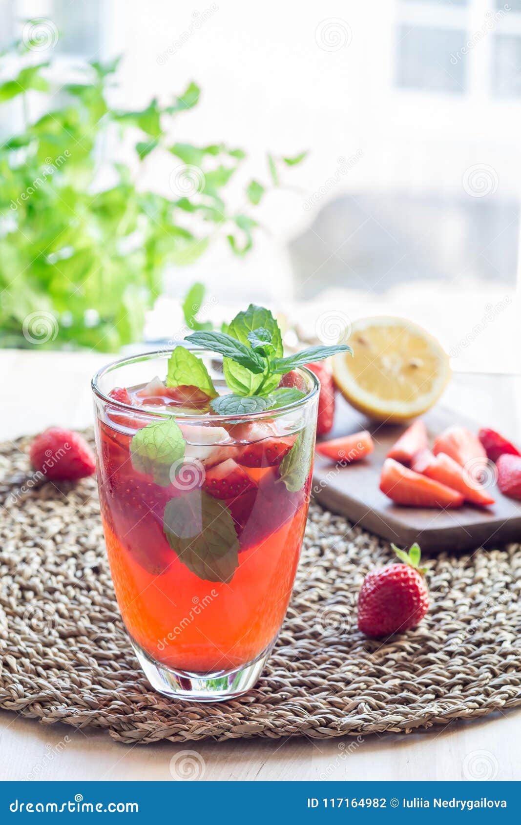 Glass of Refreshing Iced Tea with Strawberries and Mint, Vertical Stock ... Glass of Refreshing Iced Tea with Strawberries and Mint, Vertical Stock ...