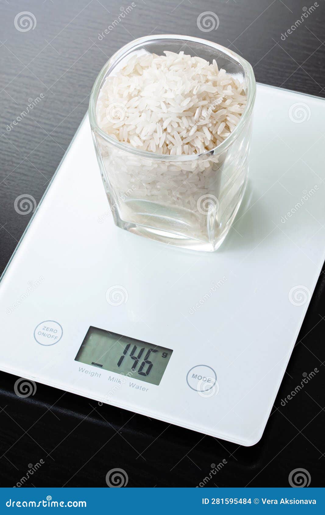 Glass with Rice on Electronic Scales on Wooden Table Stock Photo ...