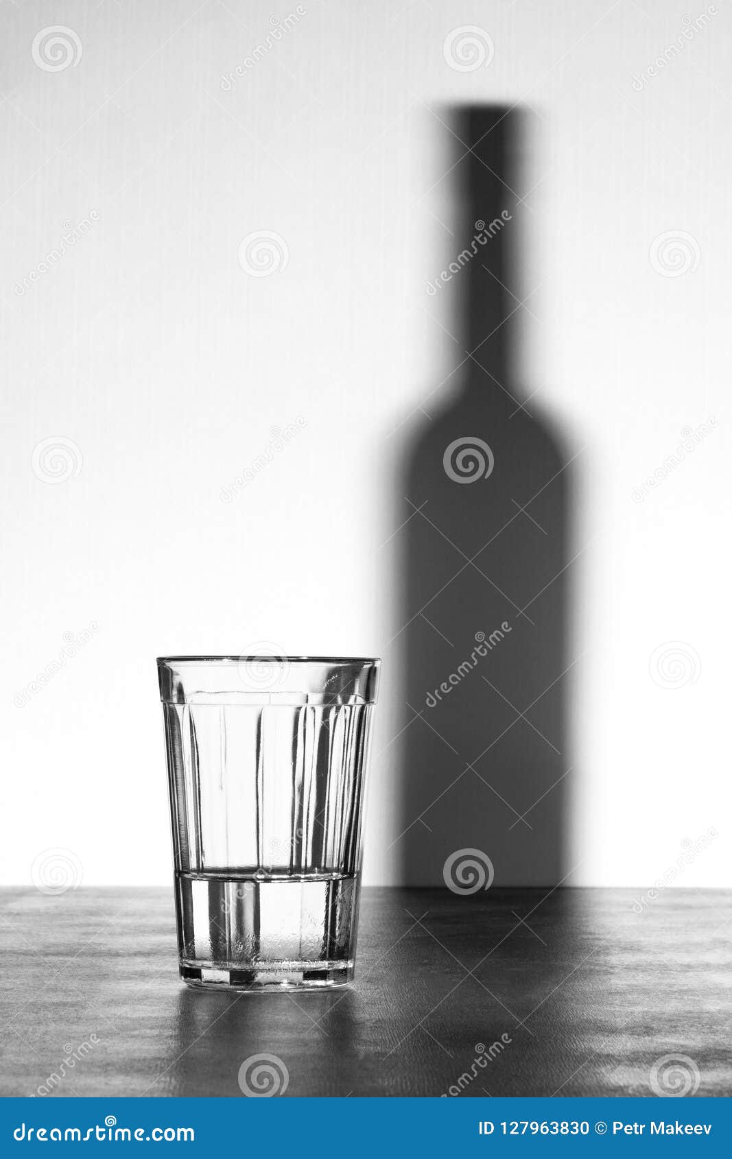 Glass and Shadow from the Bottle Stock Photo - Image of shadow, water ...