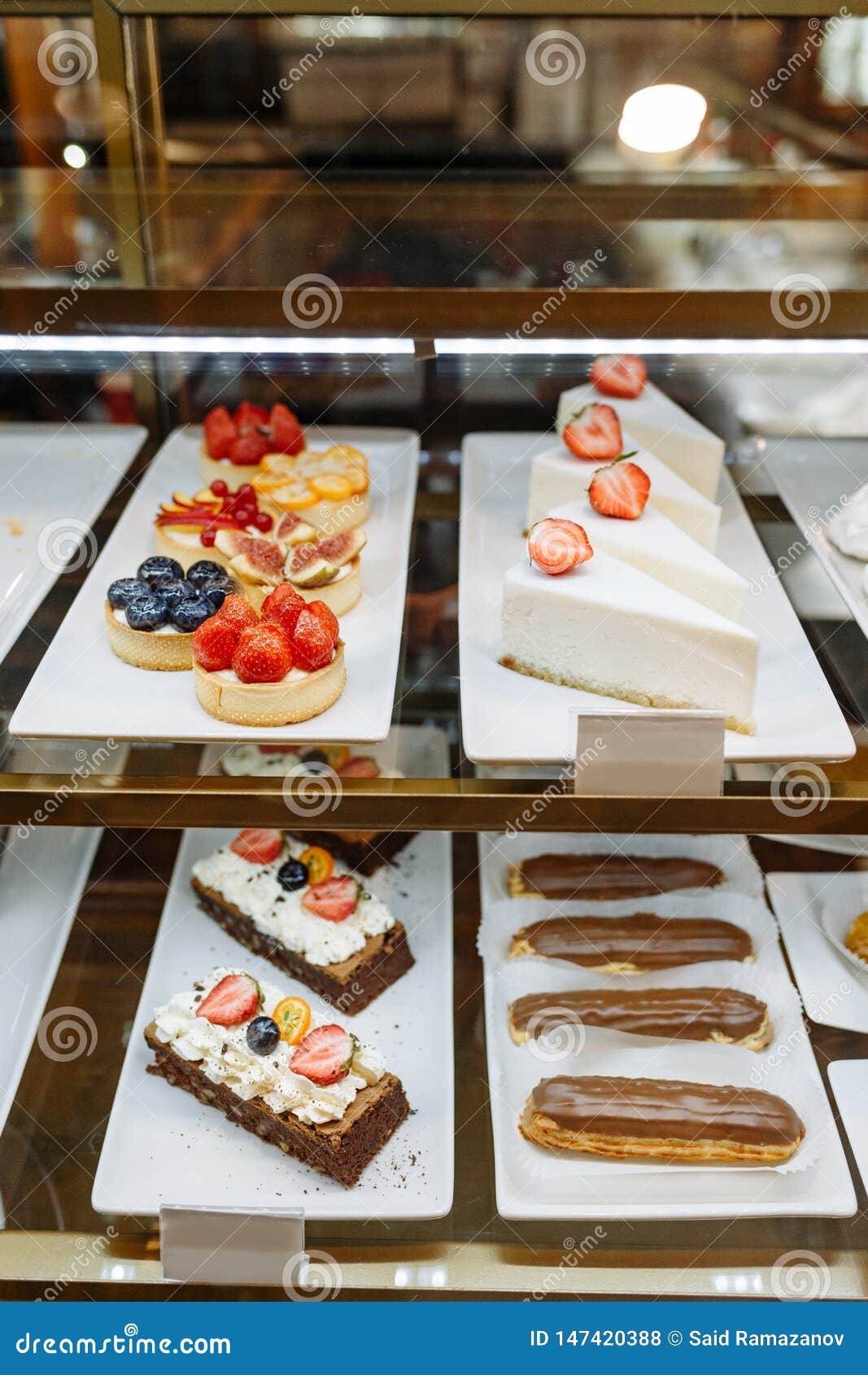 Glass Showcase with a Pastries in the Restaurant Stock Photo - Image of ...