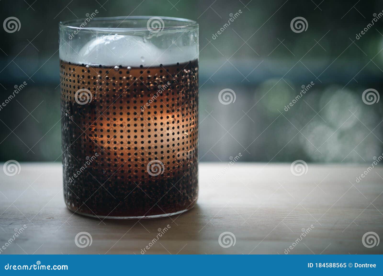 Glass of Soft Drink with Ice Ball in a Glass Stock Image - Image of ...