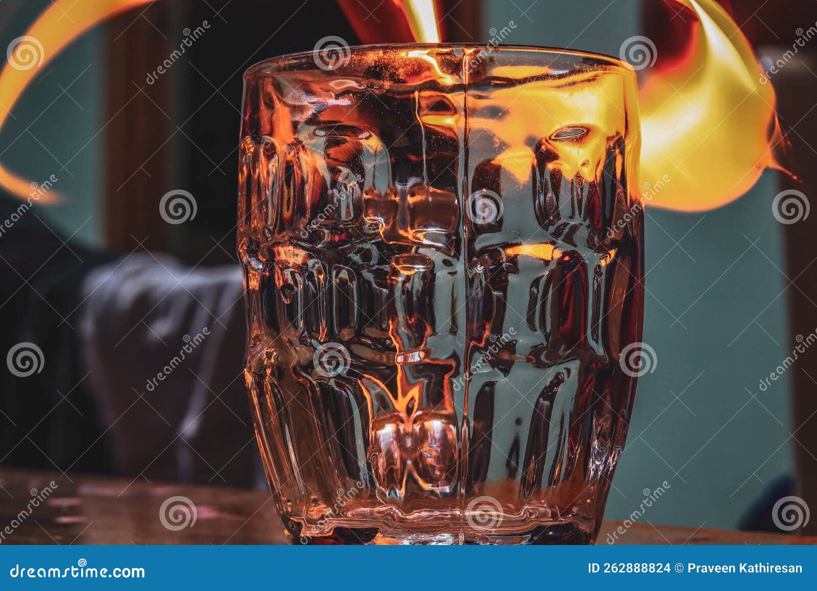 Glass Sorrounded by Fire and Reflecting the Flames Stock Photo - Image ...