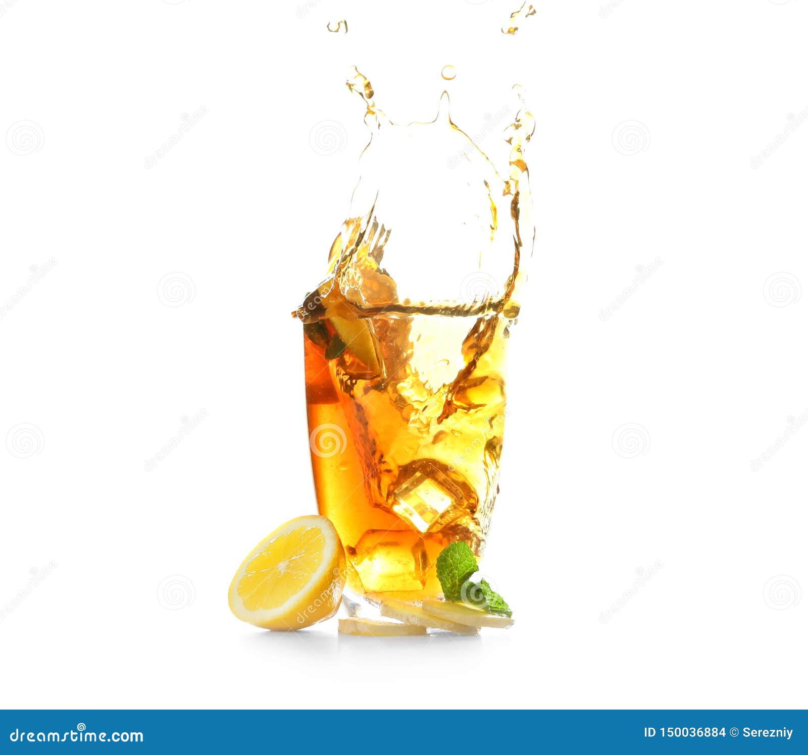 Glass and Splash of Delicious Lemon Tea with Ginger on White Background ...