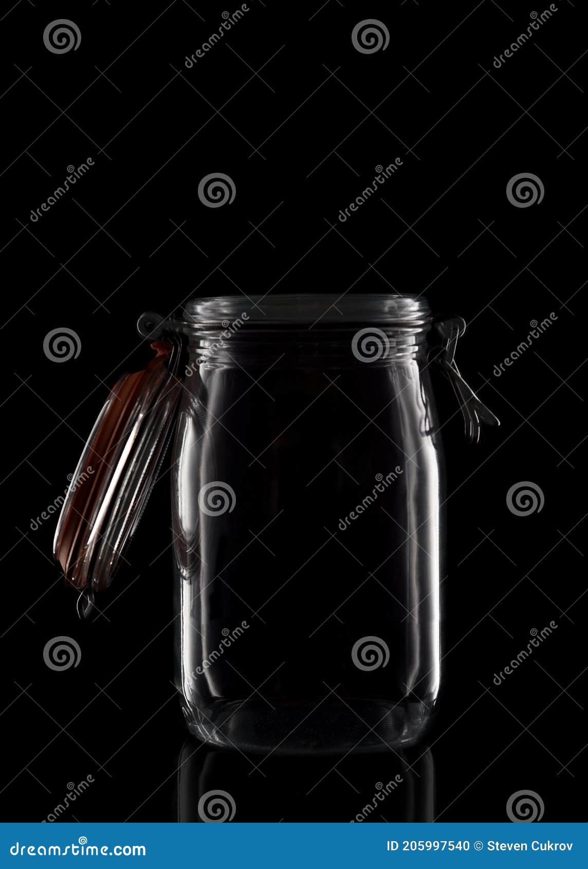 A Glass Storage or Canning Jar Isolated on Black with Reflection, with ...