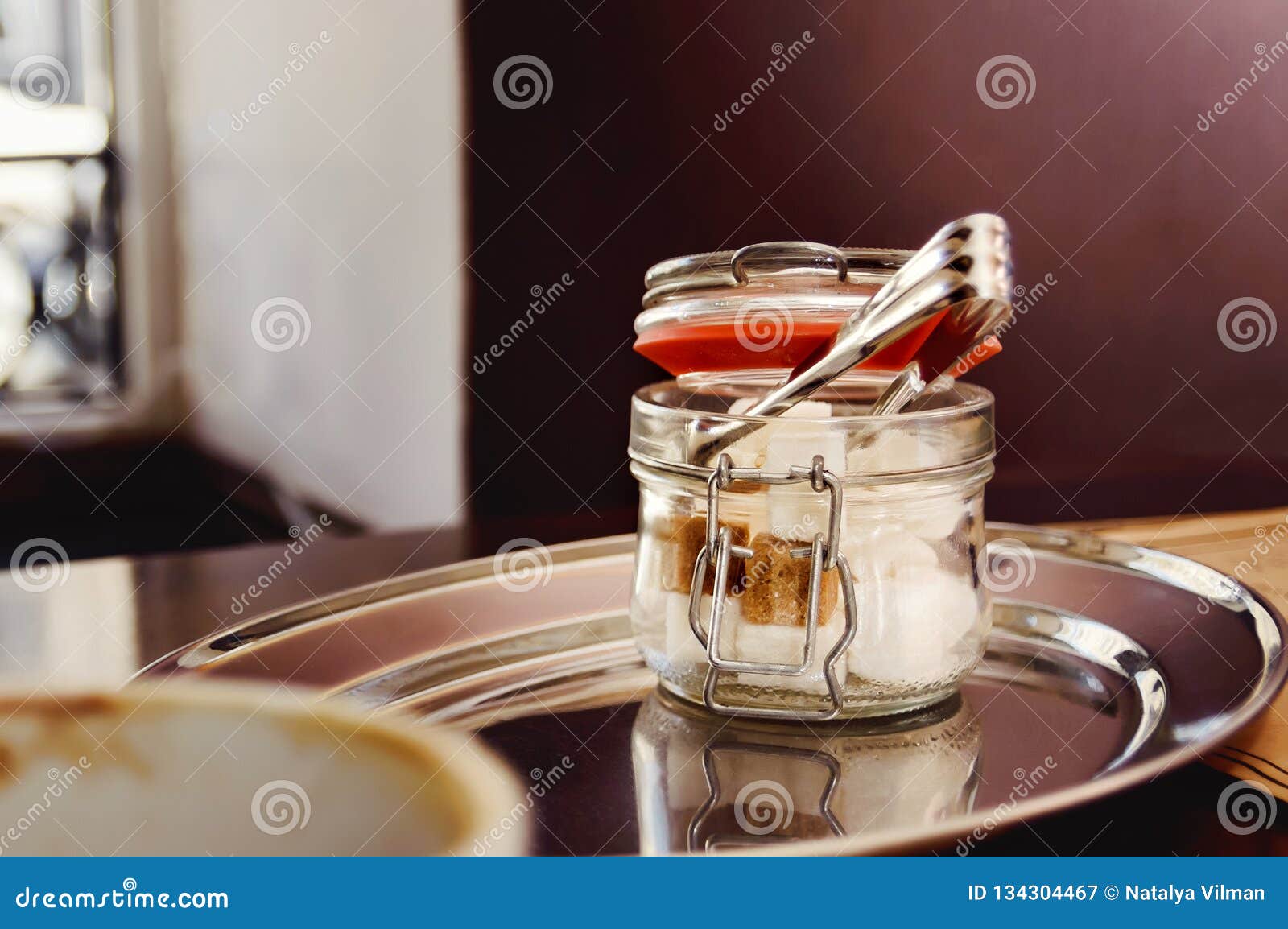 Glass Sugar Bowl with Refined Sugar on a Table in a Cafe Stock Image ...