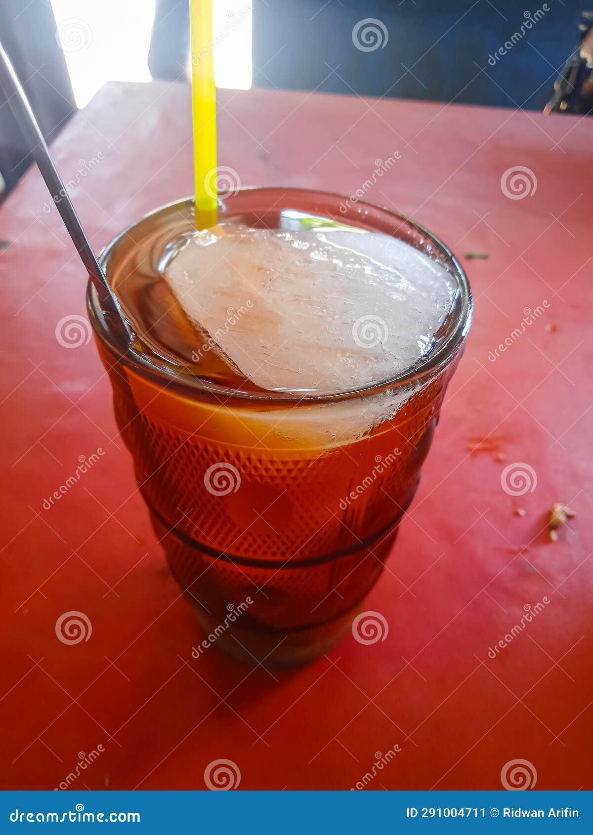 A Glass of Sweet Iced Tea on a Red Table Stock Image - Image of natural ...