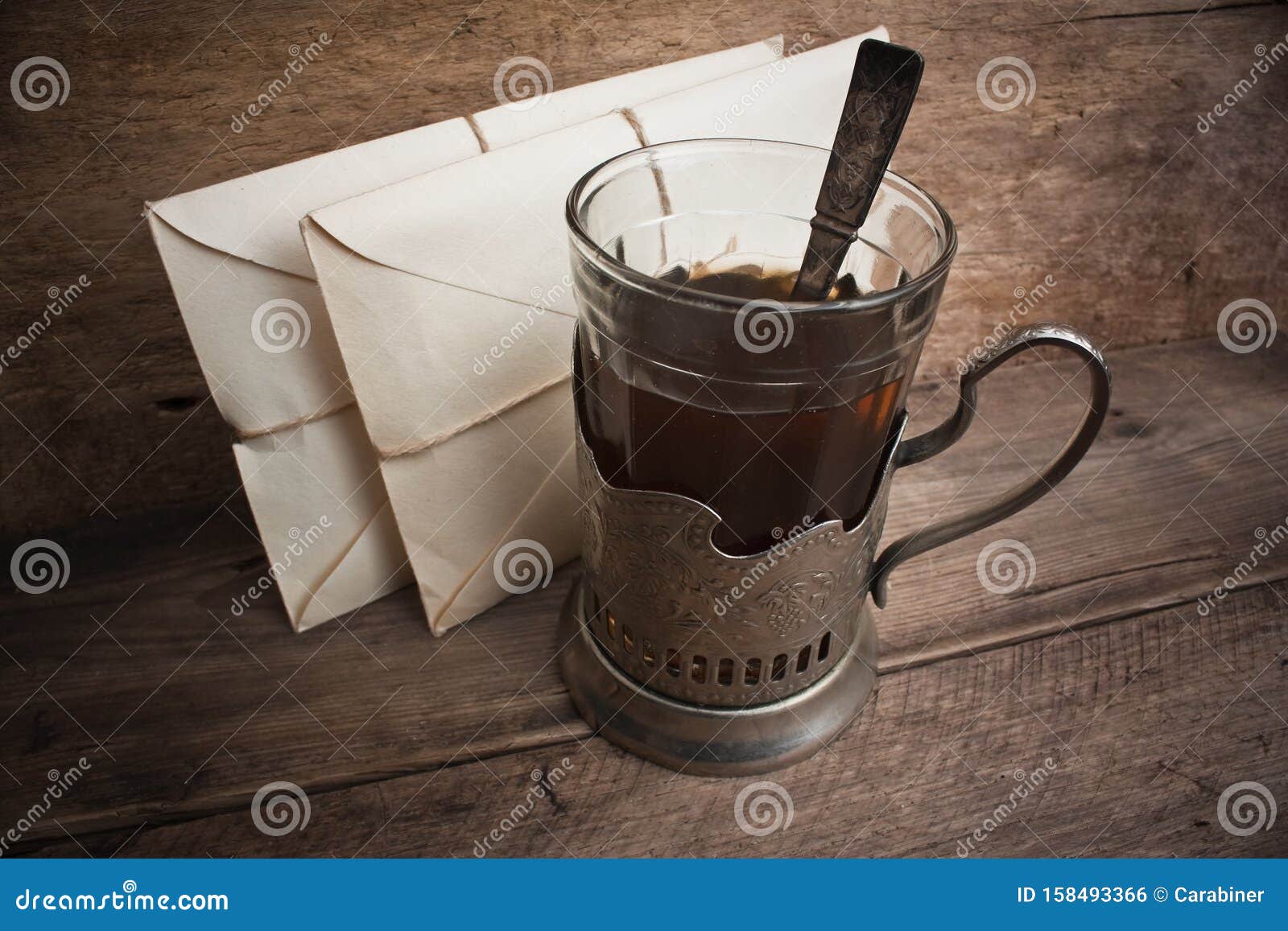 Glass of tea and letters stock photo. Image of cargo - 158493366