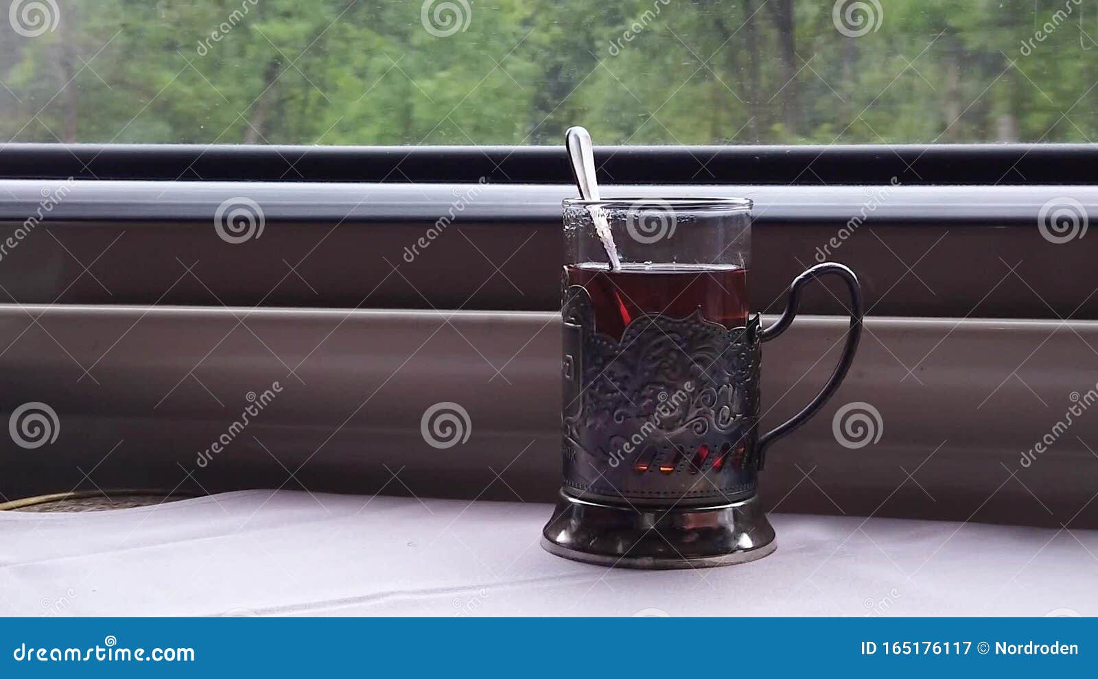 Glass of Tea on a Train Compartment Table. Stock Video - Video of ...