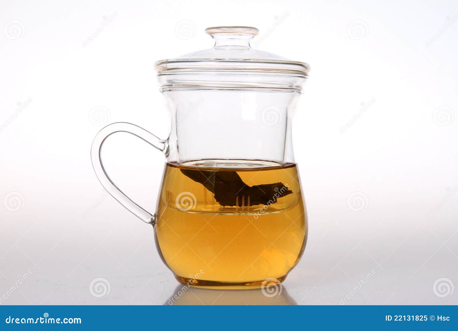 A Glass Teapot With Delicious Vitamin Orange Tea Stands On A Stand With ...
