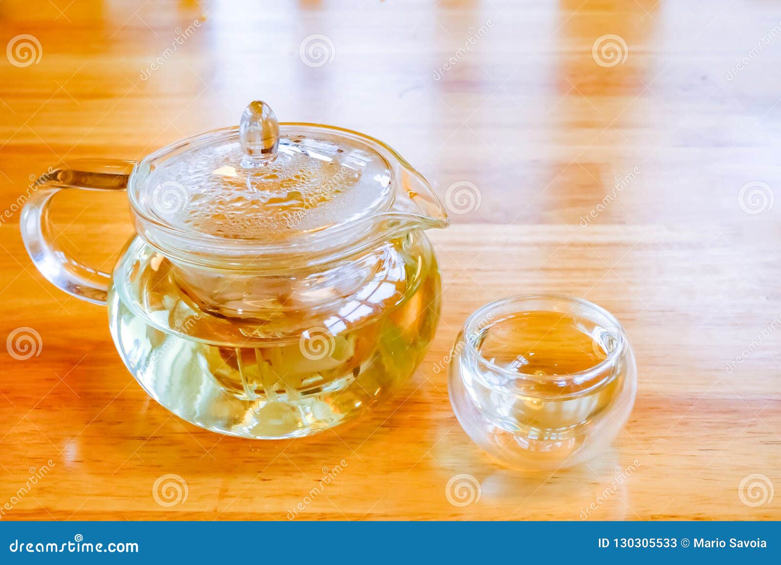 Glass teapot and cup stock image. Image of space, brown - 130305533