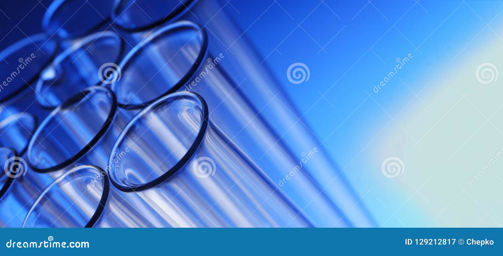 Glass Test Tube on Blue Background with Substance Stock Image - Image ...