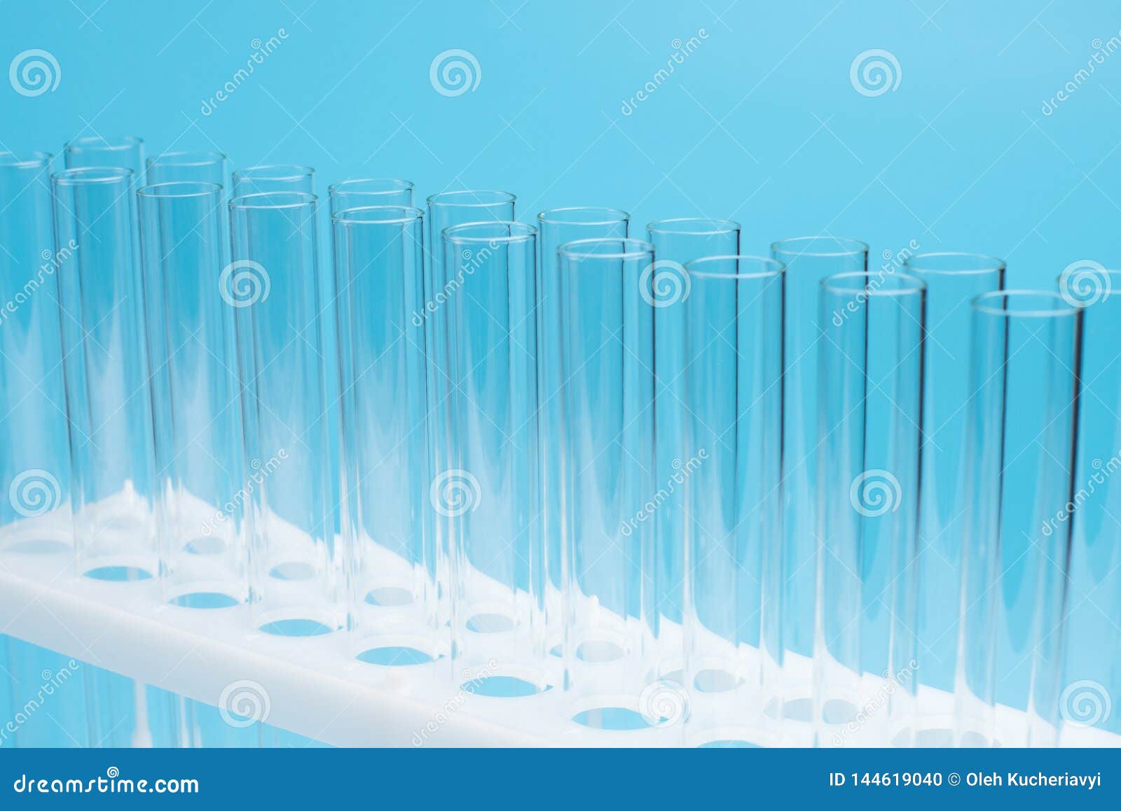 Glass Test Tubes in a Stand on Blue Background Stock Photo - Image of ...