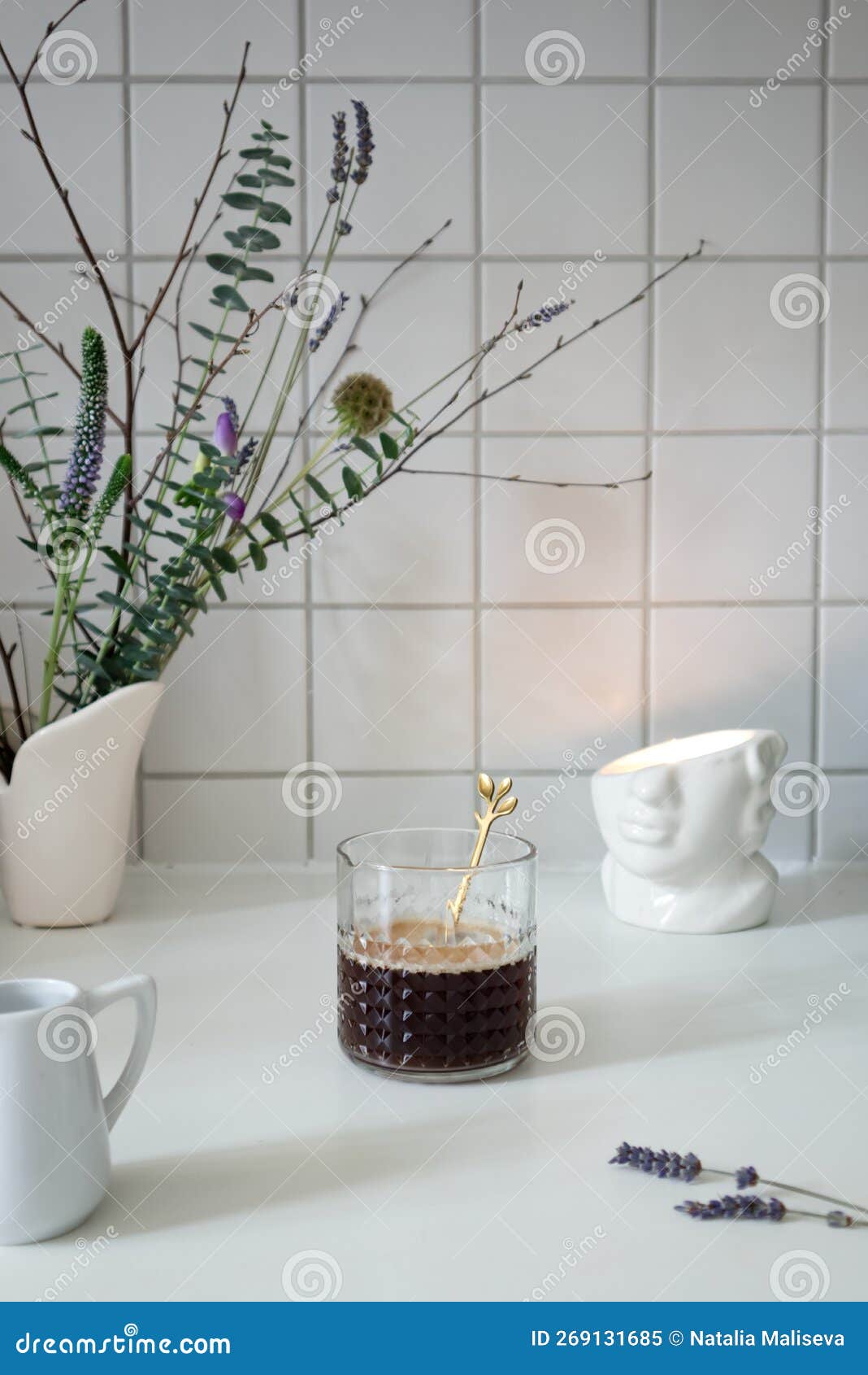 Glass Texture Cup with Black Coffee beside Vase with Bouquet on Table ...