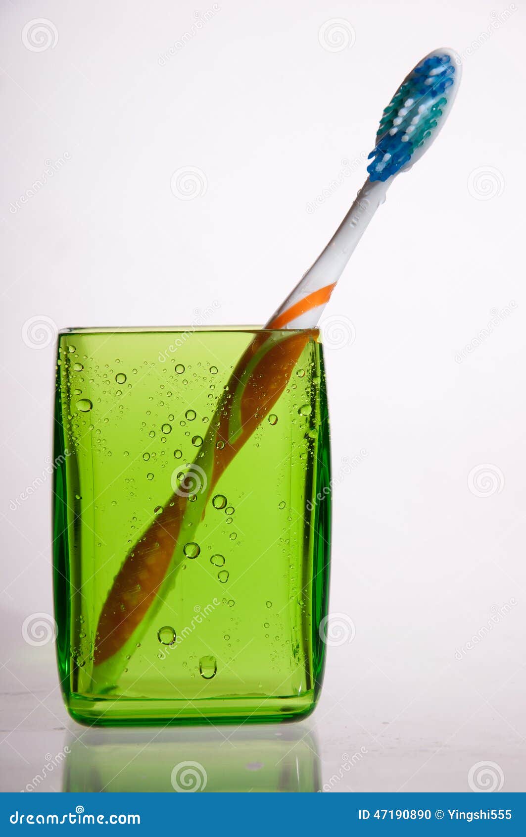 Glass and toothbrush stock photo. Image of care, bright - 47190890