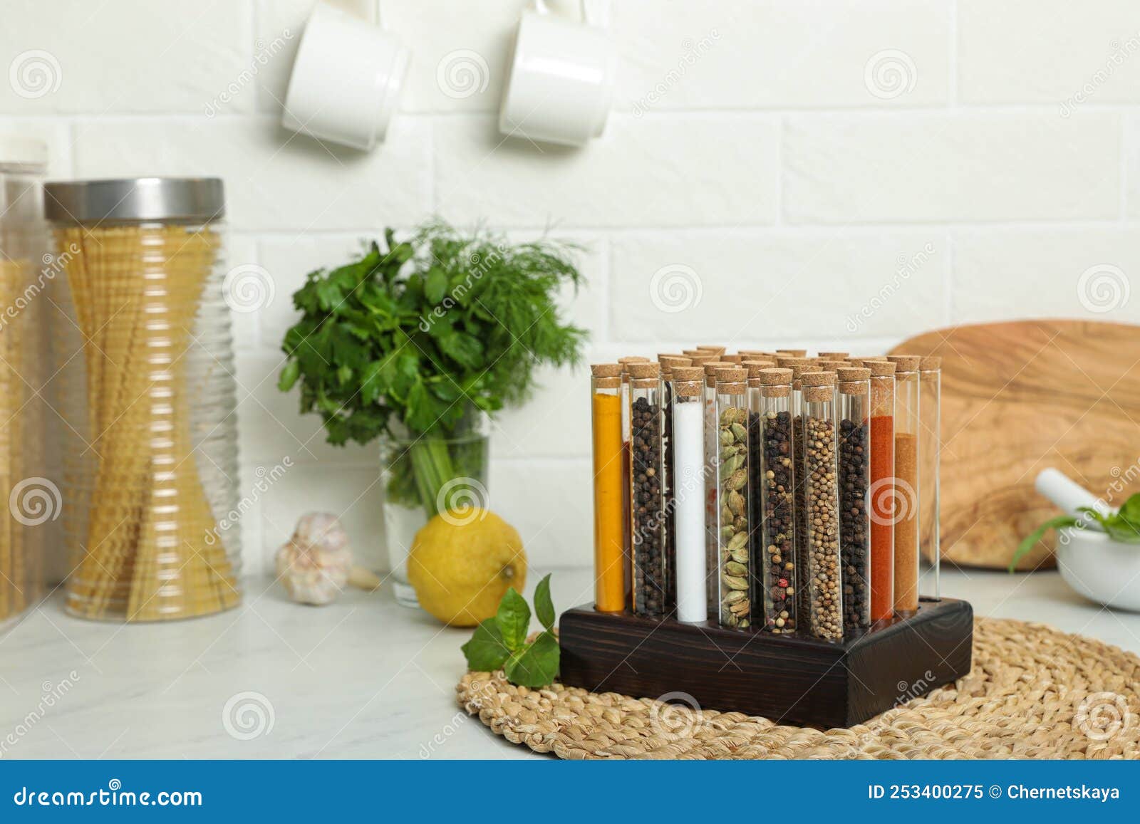 Glass Tubes with Different Spices on Kitchen Counter Stock Image ...