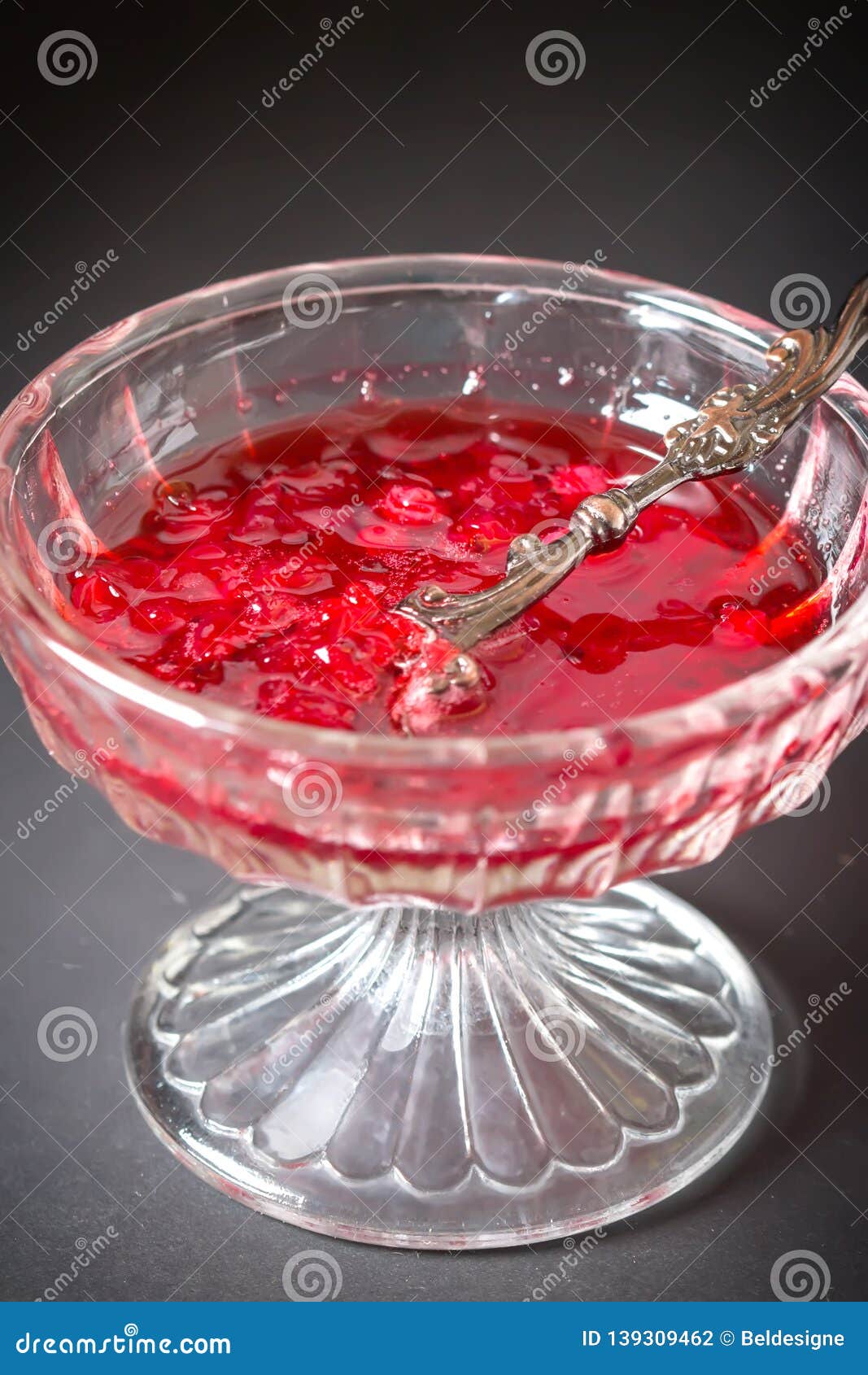 A Glass Vase with Delicious Bright Translucent Redcurrant Jam Stock ...