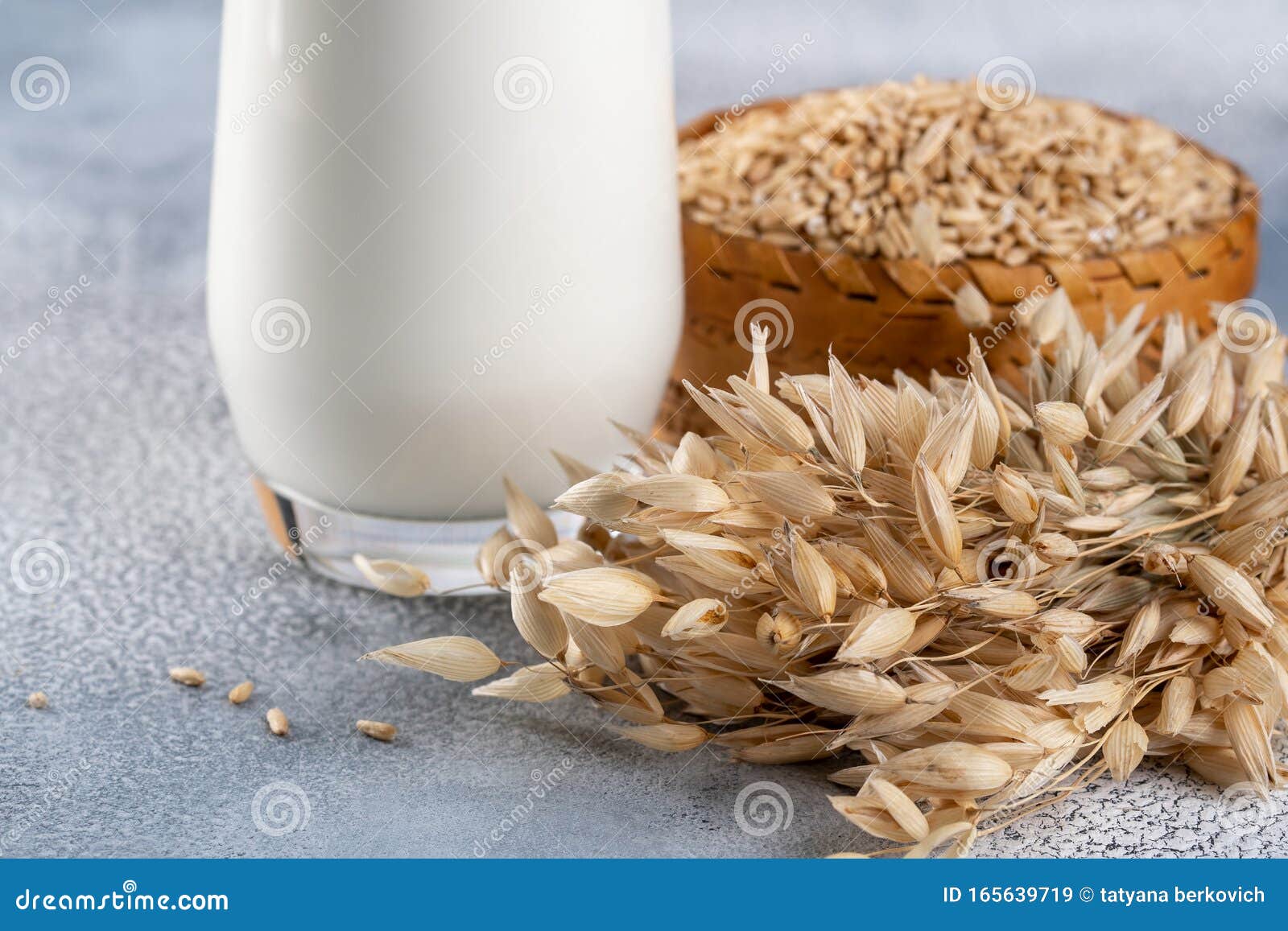 Glass of Vegan Oat Milk and Oat on a Table, Space for Text Stock Image ...