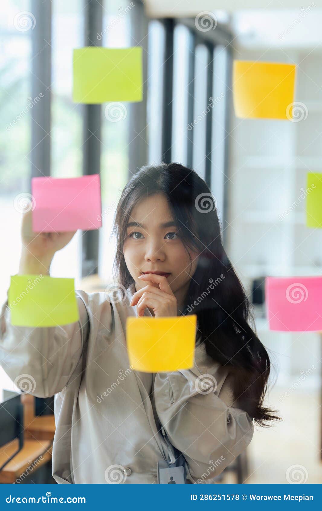 Through Glass View of Businesswoman Analyzing Process Schedule ...
