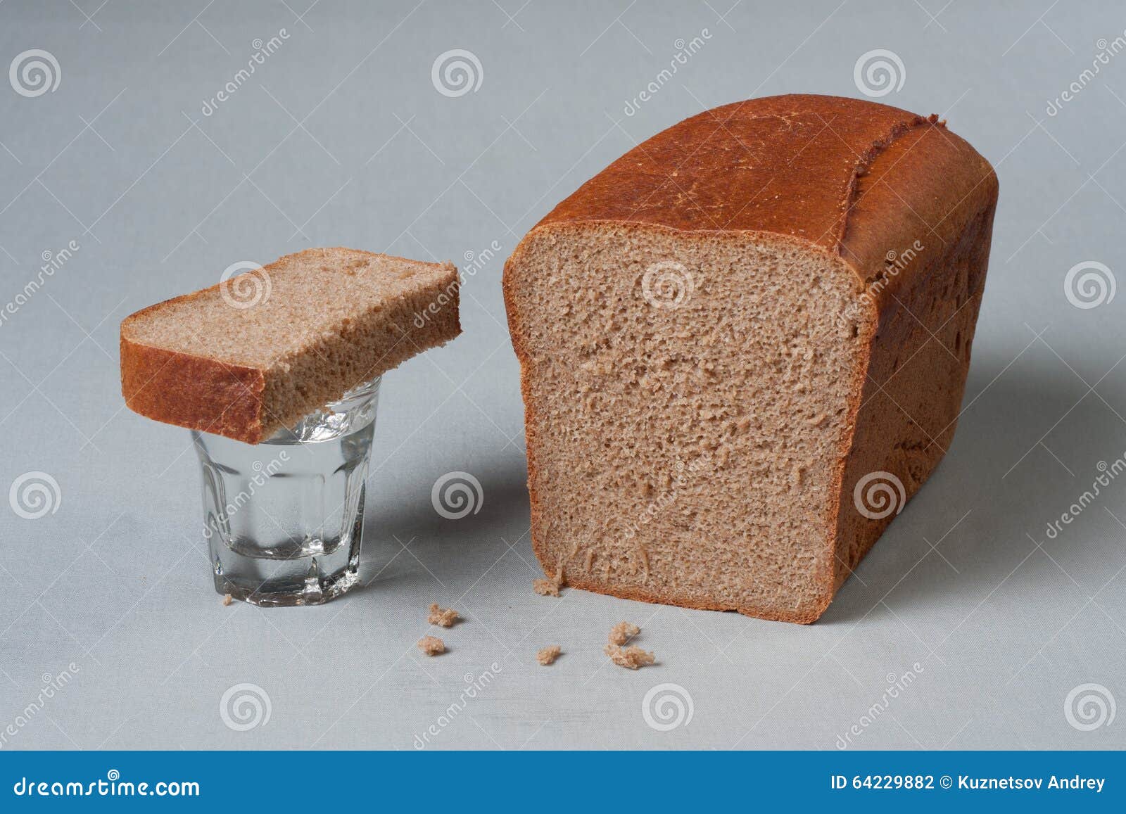Glass of Vodka, Bread and Crumbs Stock Photo - Image of glass, water ...