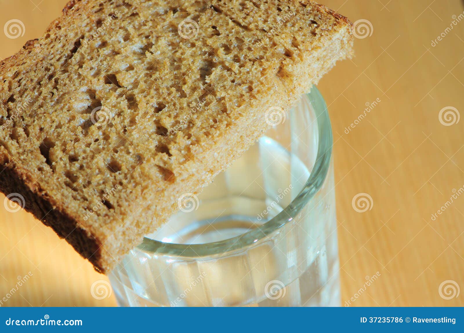 Glass of Vodka and a Piece of Bread on a Wooden Table Stock Photo ...