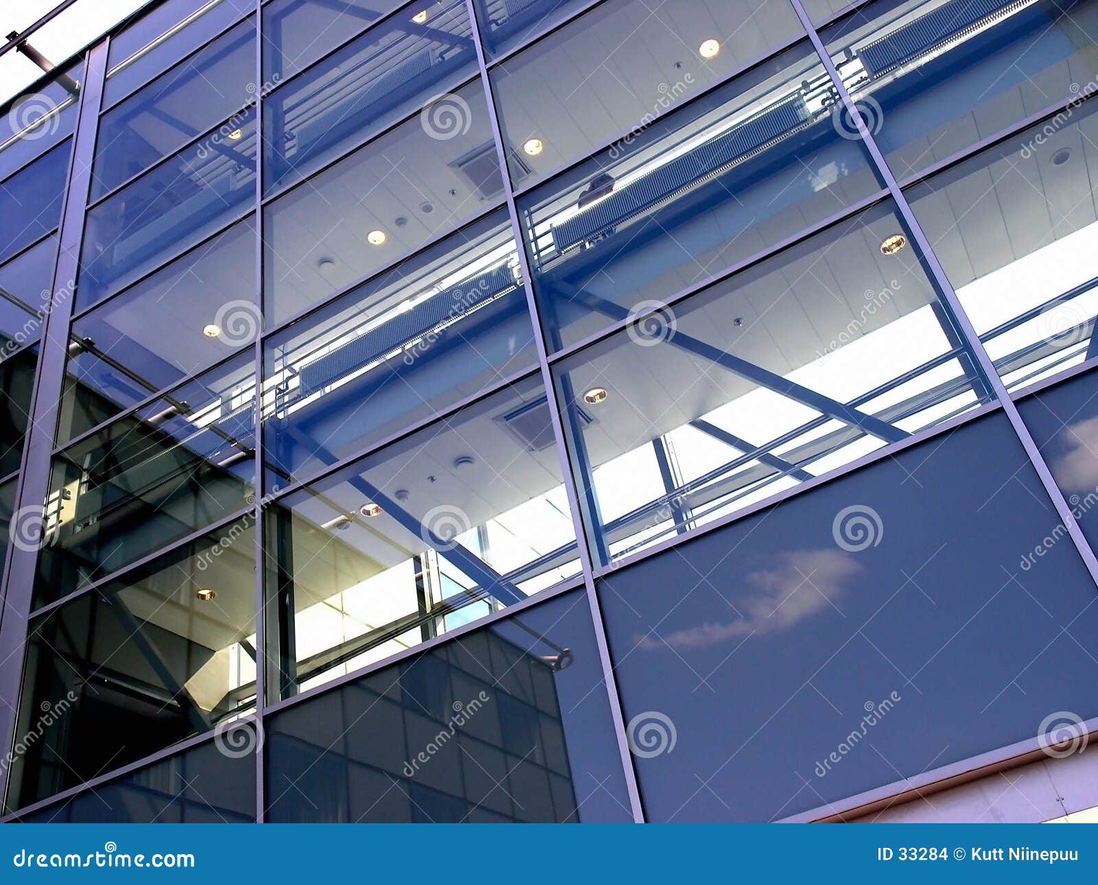 Glass Wall Of A Shopping Center. Night View Of The Glass Facade Of A ...