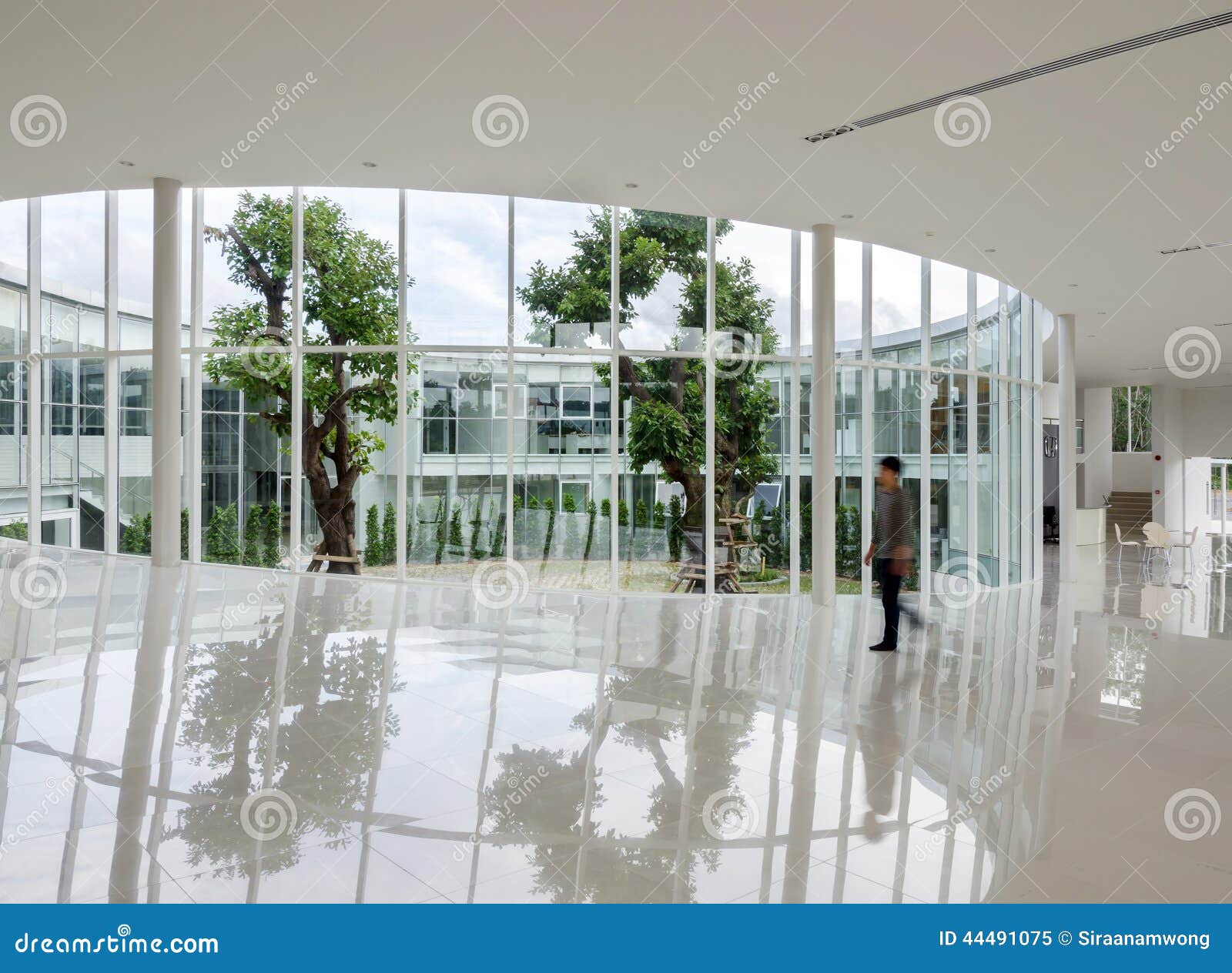 Glass Wall in the Building with People Walking Stock Image - Image of ...