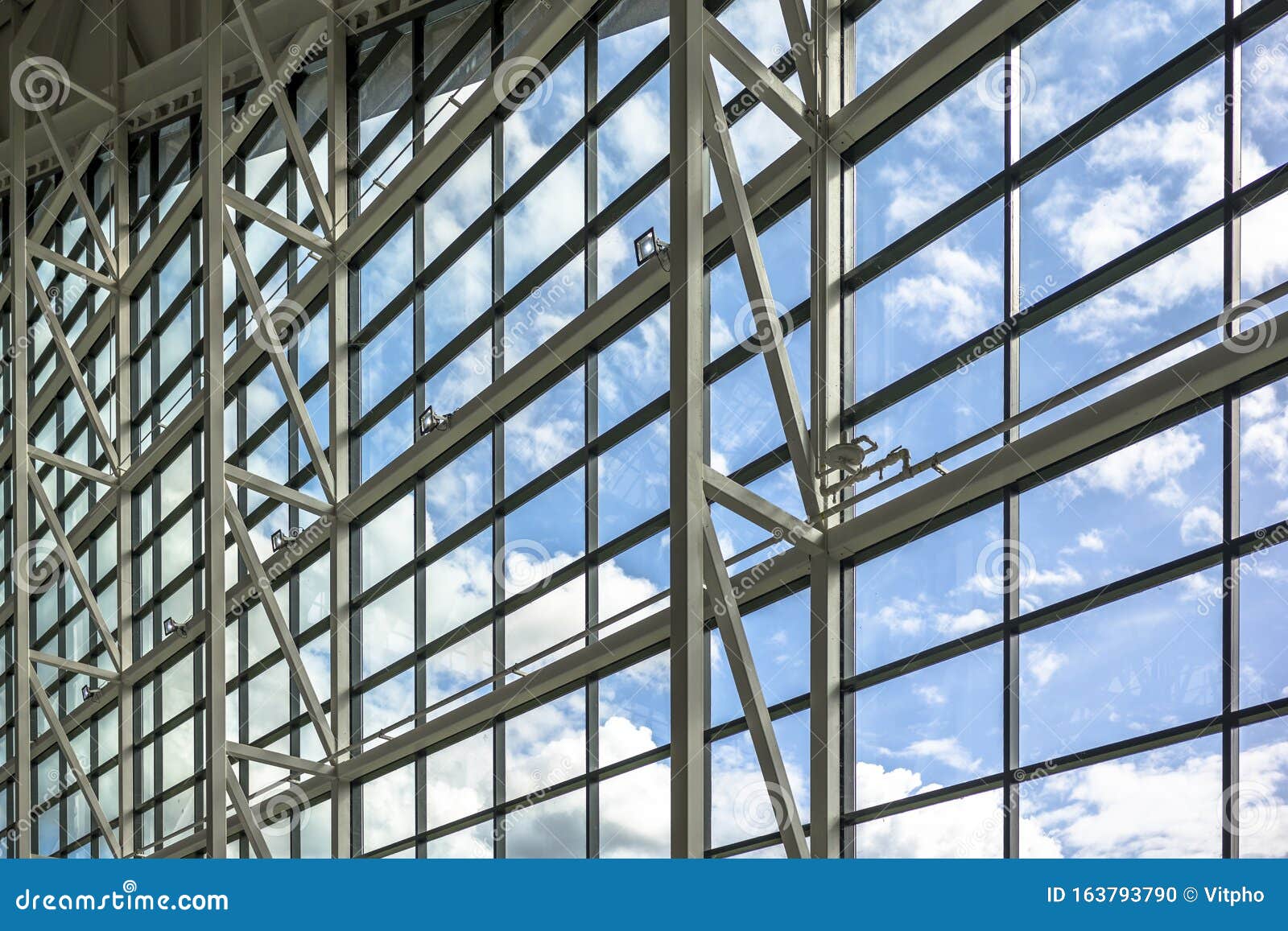 Glass Wall with Metal Support Structure with Cloudy Sky Outside Stock ...
