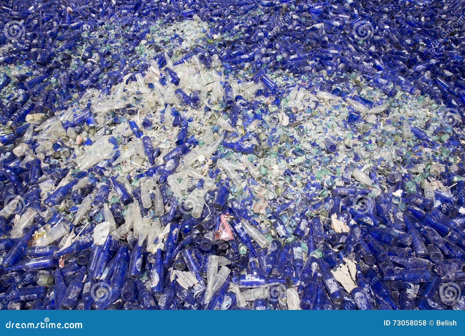 Glass Waste in Recycling Facility. Blue Bottles Editorial Stock Photo ...