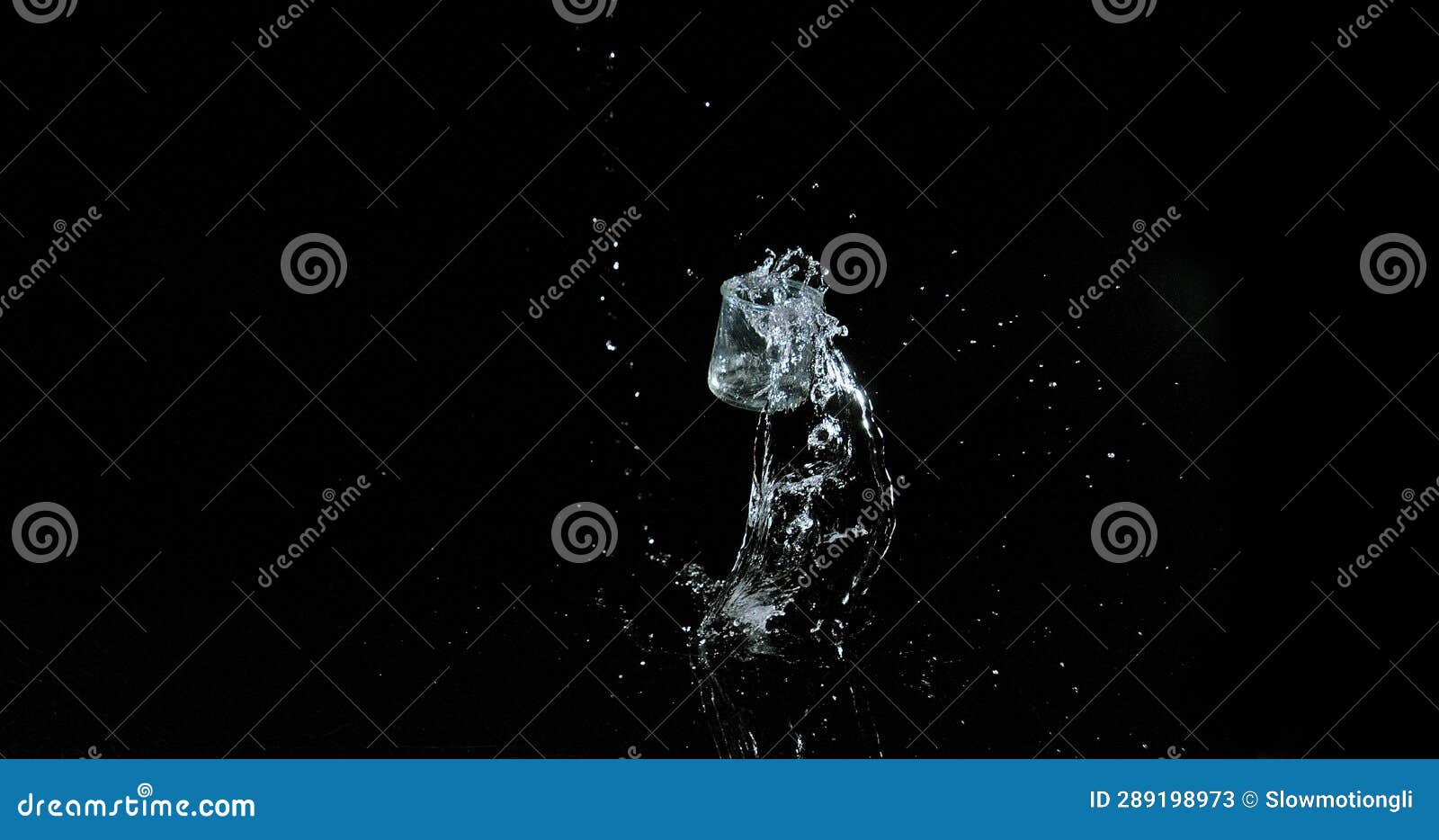 Glass of Water Bouncing and Splashing on Black Background Stock Image ...