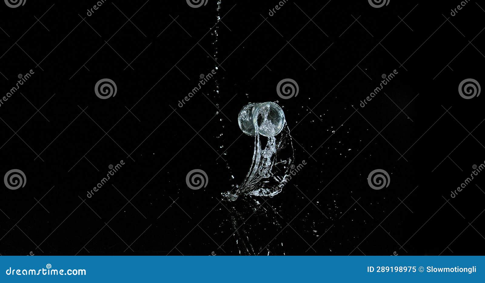 Glass of Water Bouncing and Splashing on Black Background Stock Image ...
