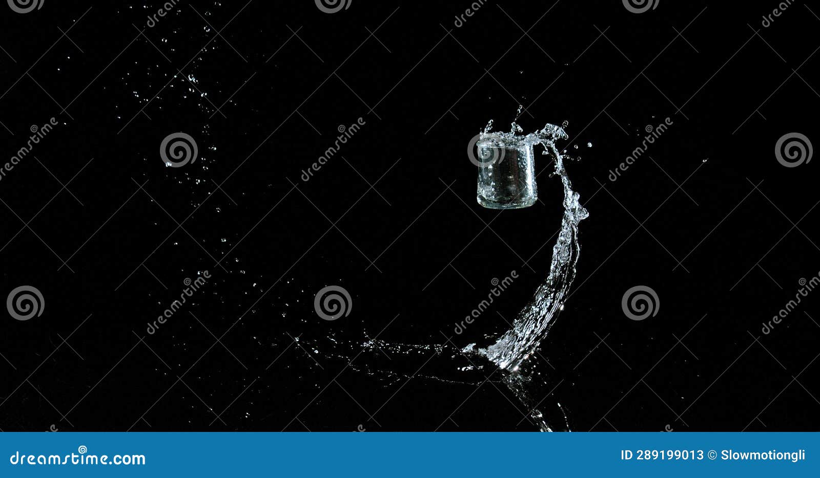 Glass of Water Bouncing and Splashing on Black Background Stock Image ...
