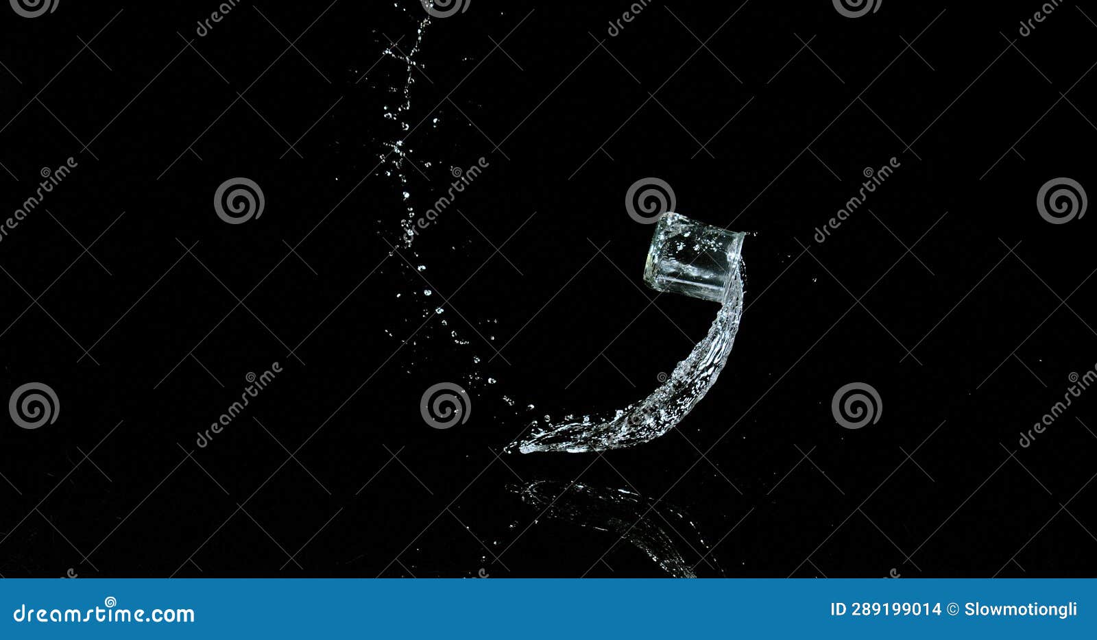 Glass of Water Bouncing and Splashing on Black Background Stock Photo ...