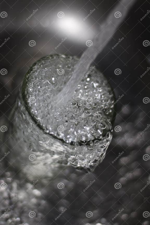 Glass of a Water with Overflow Stock Photo - Image of abstract ...
