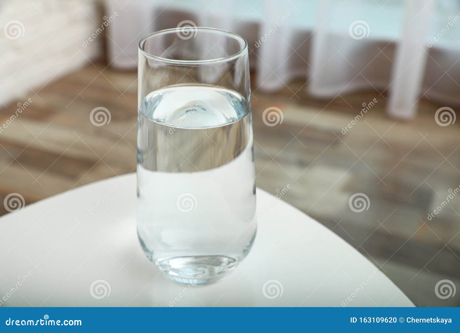 Glass of Water on Table. Refreshing Drink Stock Photo - Image of ...