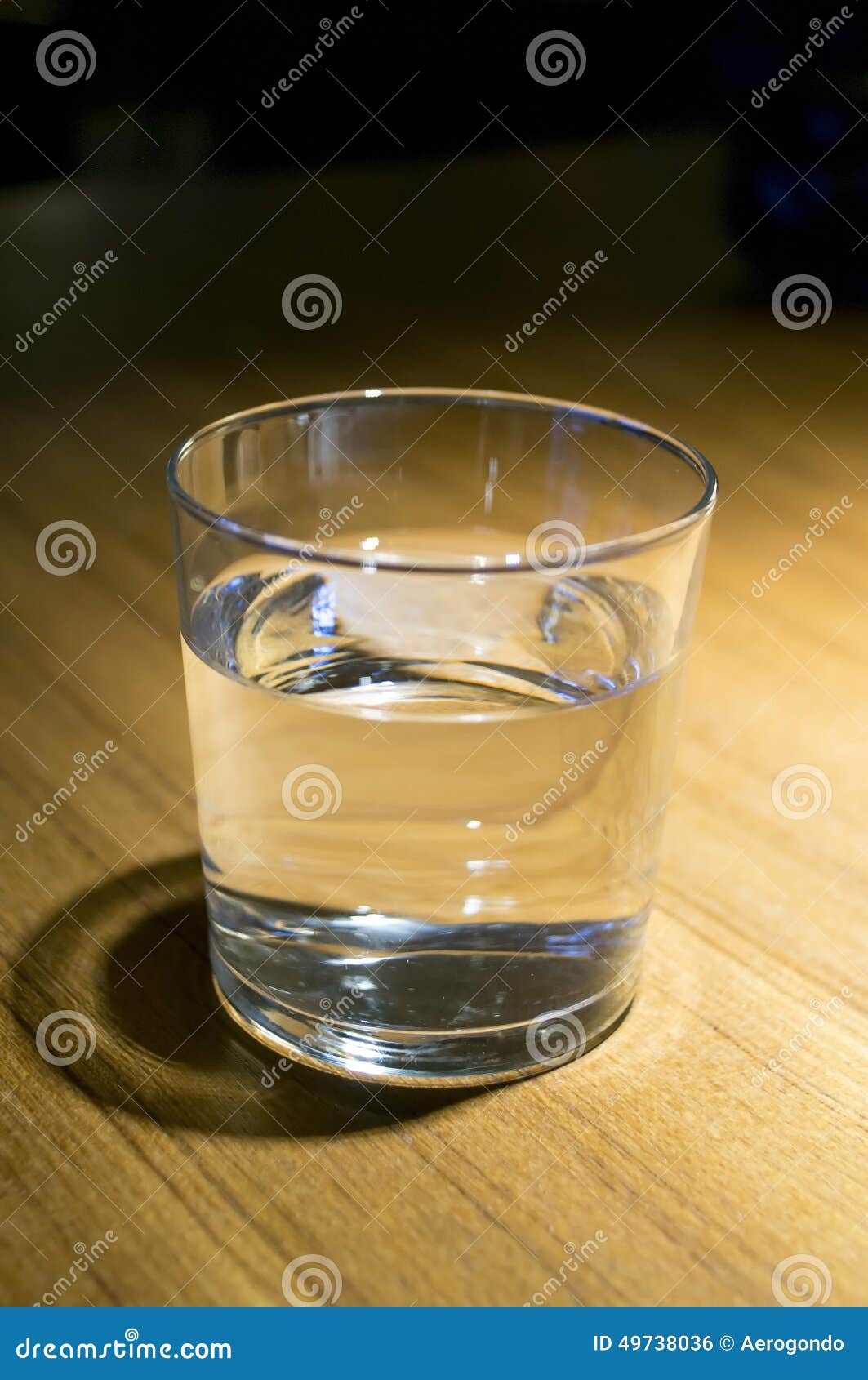 Glass of water on table stock photo. Image of blue, freshness - 49738036
