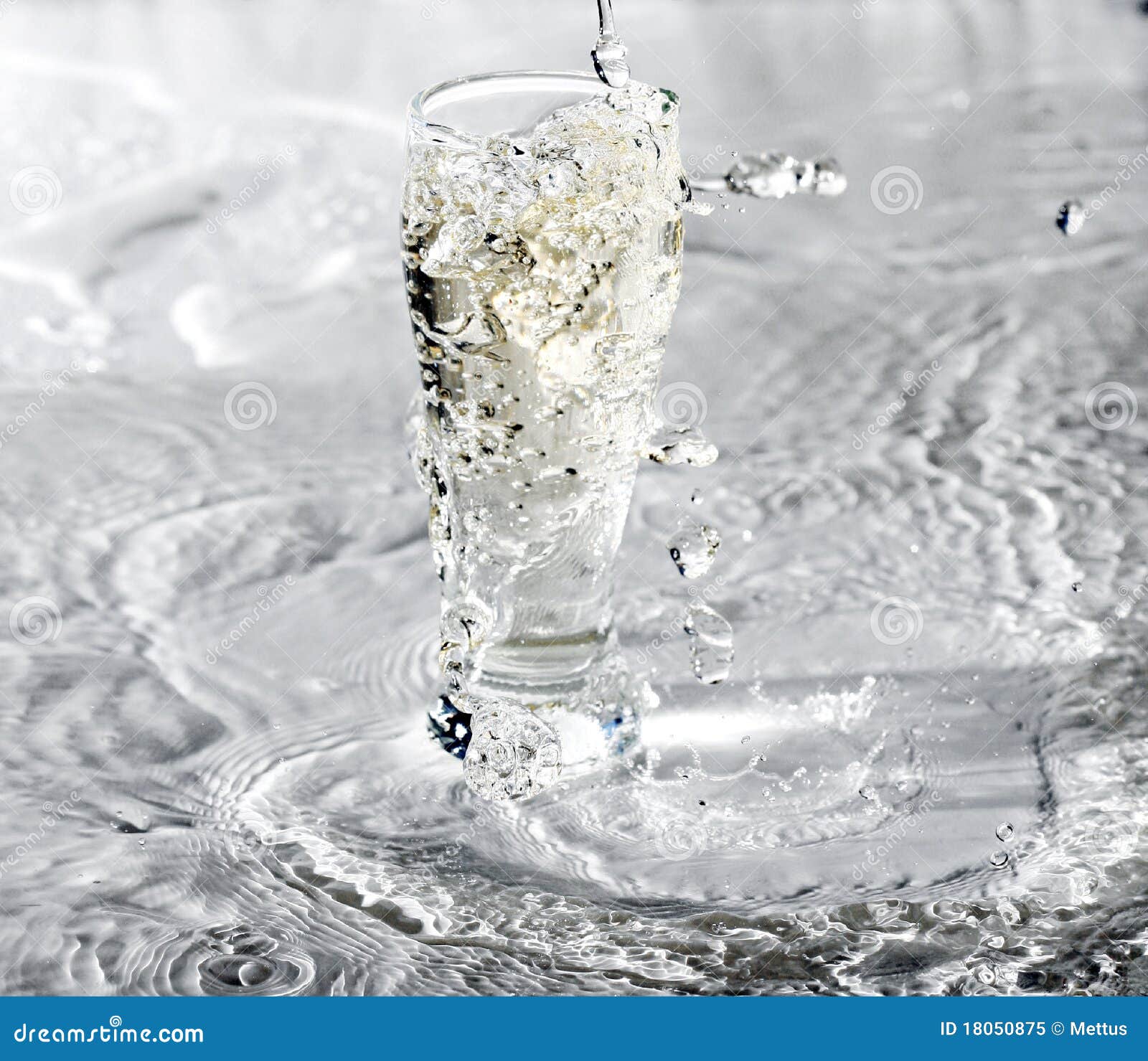 Glass of Water on white stock image. Image of pouring - 18050875