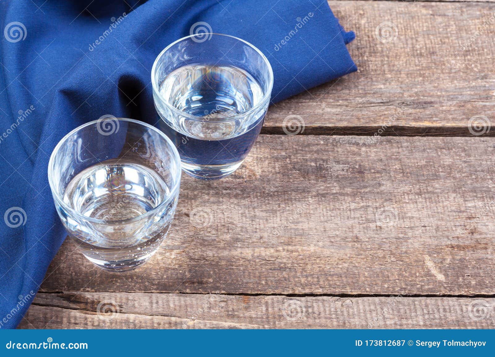 Glass of Water on a Wooden Table Stock Image - Image of green ...
