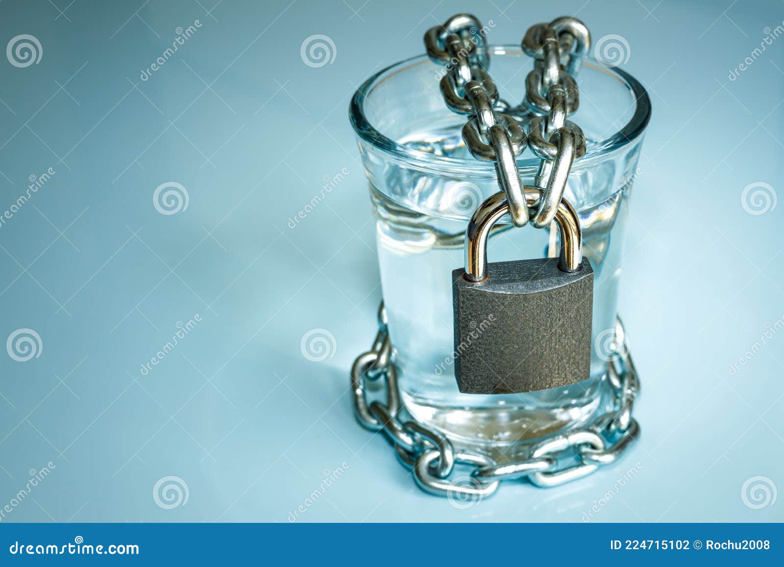 A Glass of Water Wrapped in a Chain and Closed with a Padlock. the ...