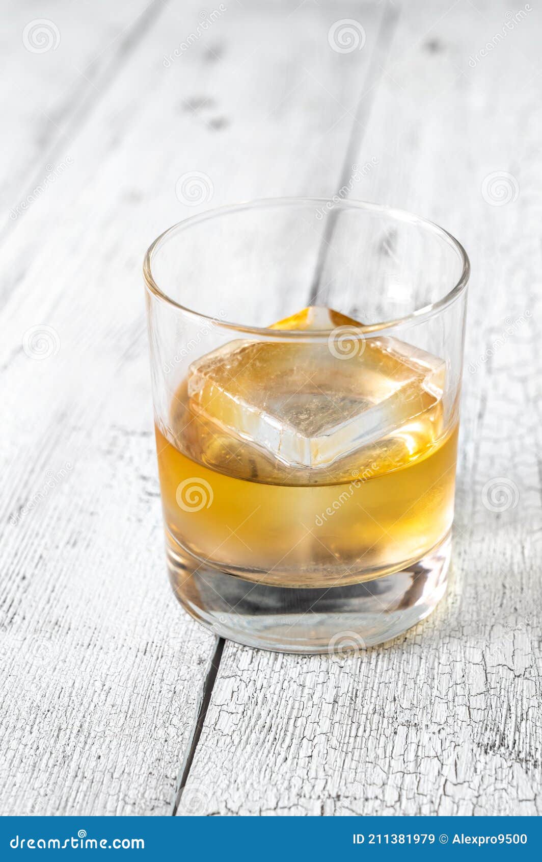 Glass of Whiskey with Ice Cube Stock Image - Image of booze, cool ...