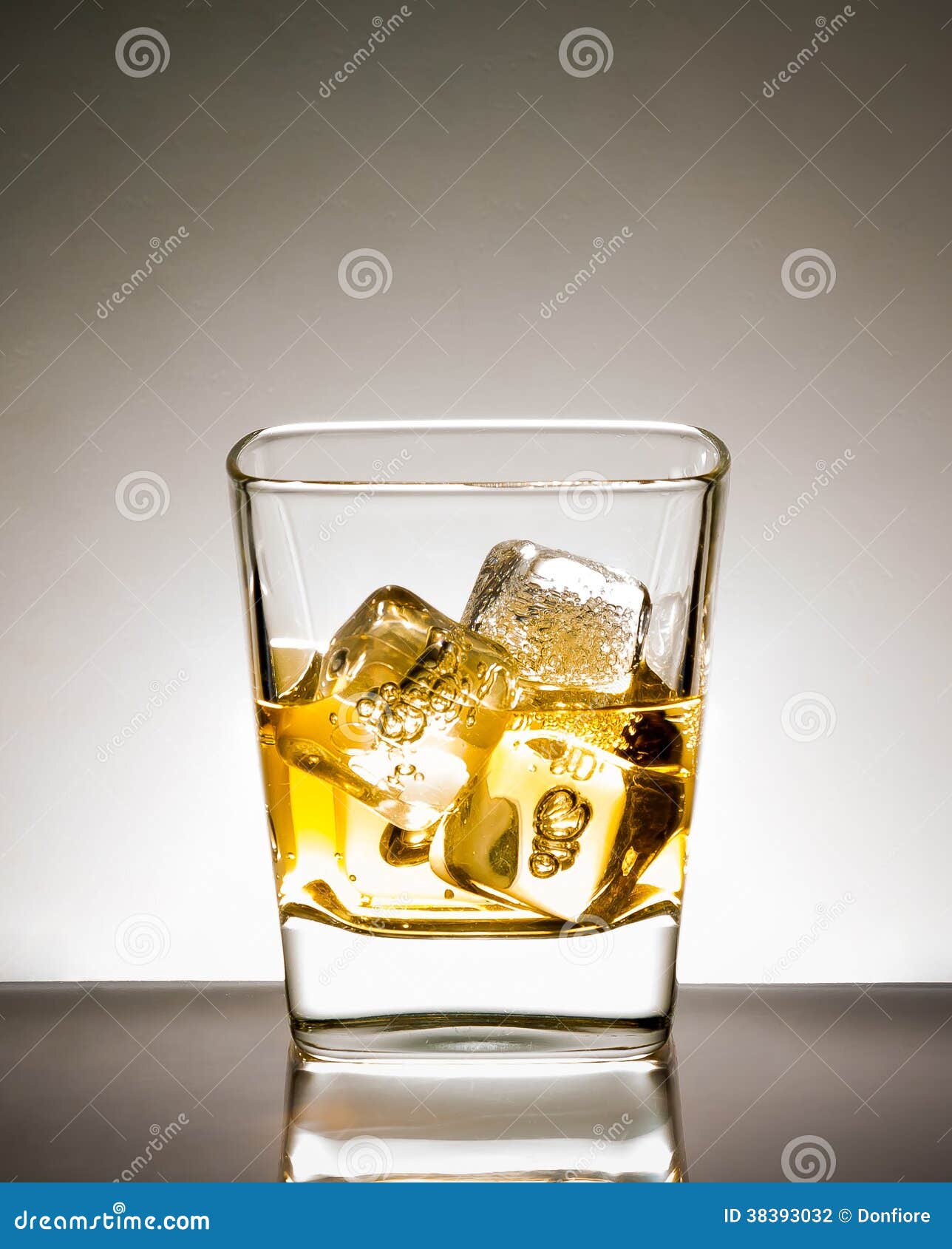 Glass of whisky with ice stock photo. Image of liquor - 38393032