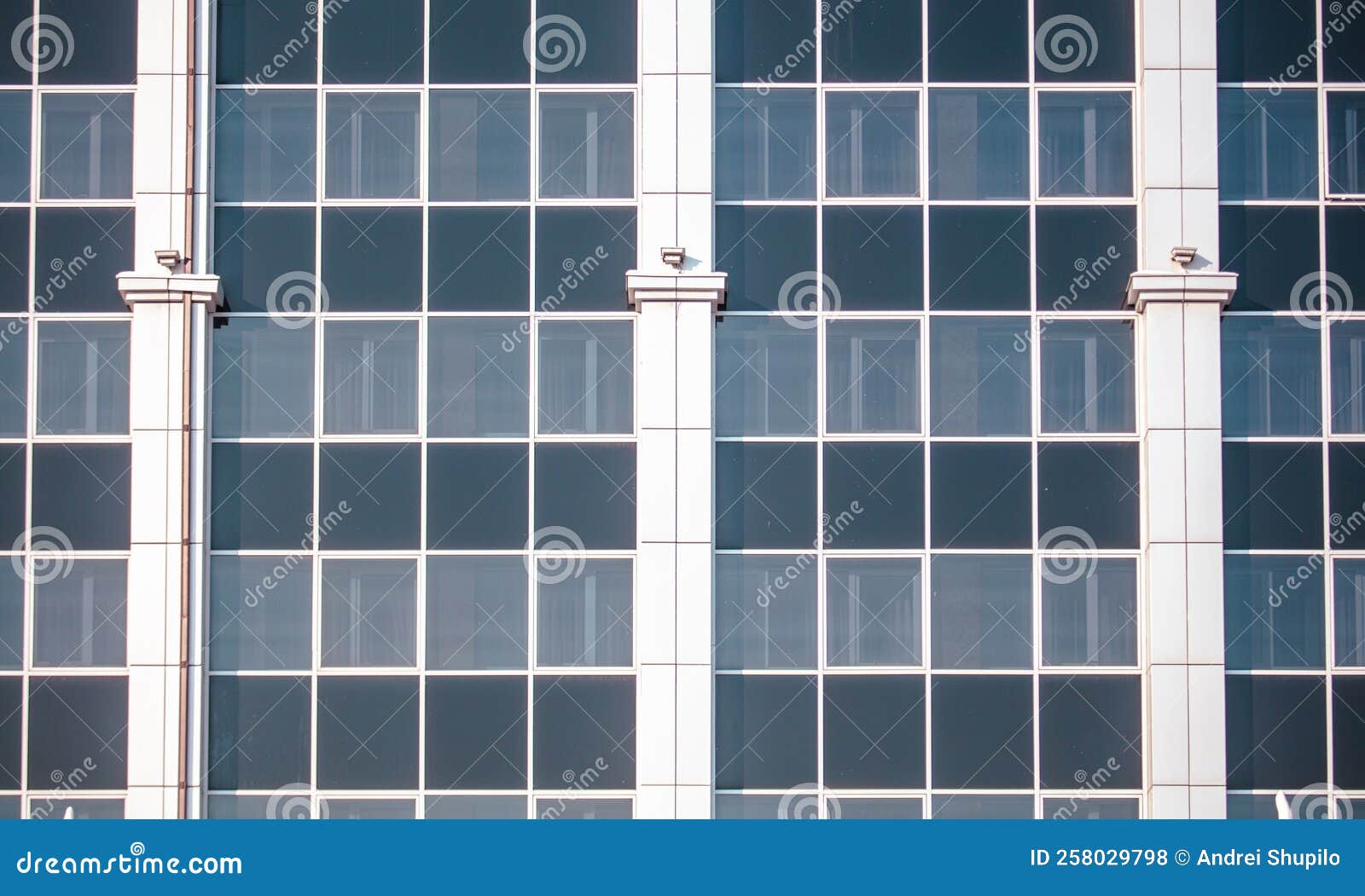 Glass Windows of a Multi-storey Building As an Abstract Background ... Glass Windows of a Multi-storey Building As an Abstract Background ...