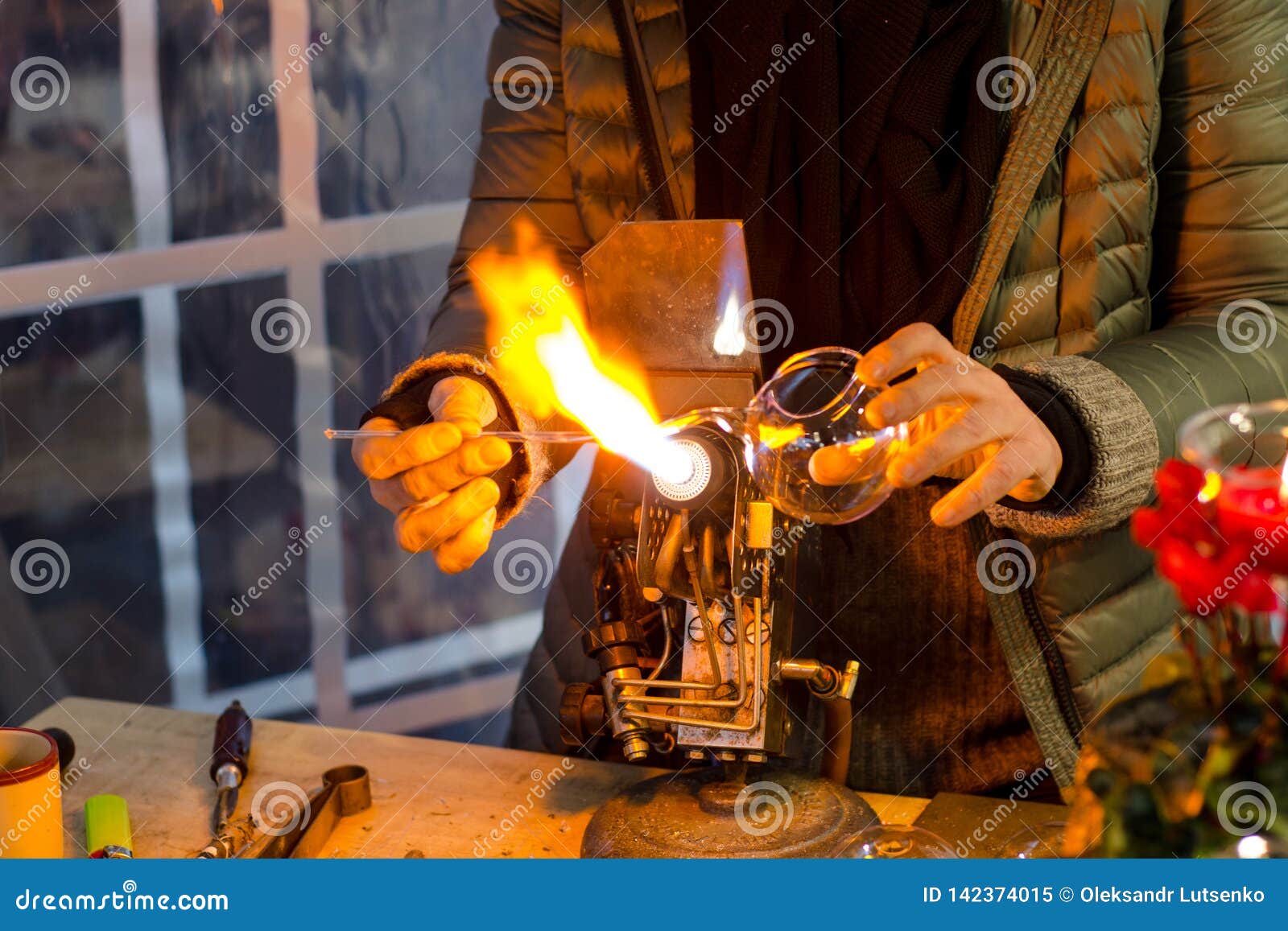 Glassblower at work stock image. Image of blower, glassblower - 142374015