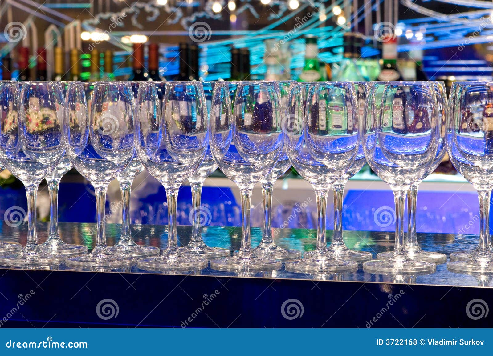 Glasses on a bar rack stock photo. Image of restaurant - 3722168
