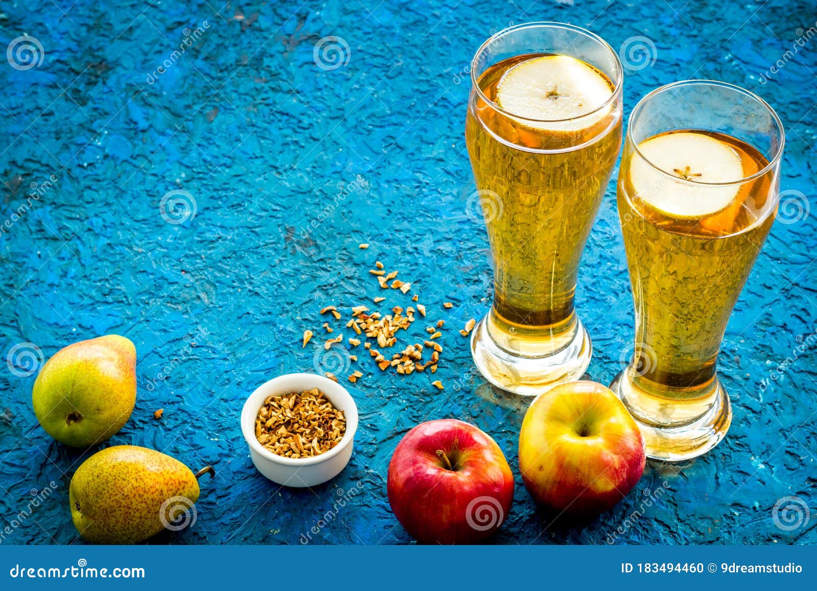 Glasses of Beer with Apple and Peer on Blue Table Copy Space Stock ...