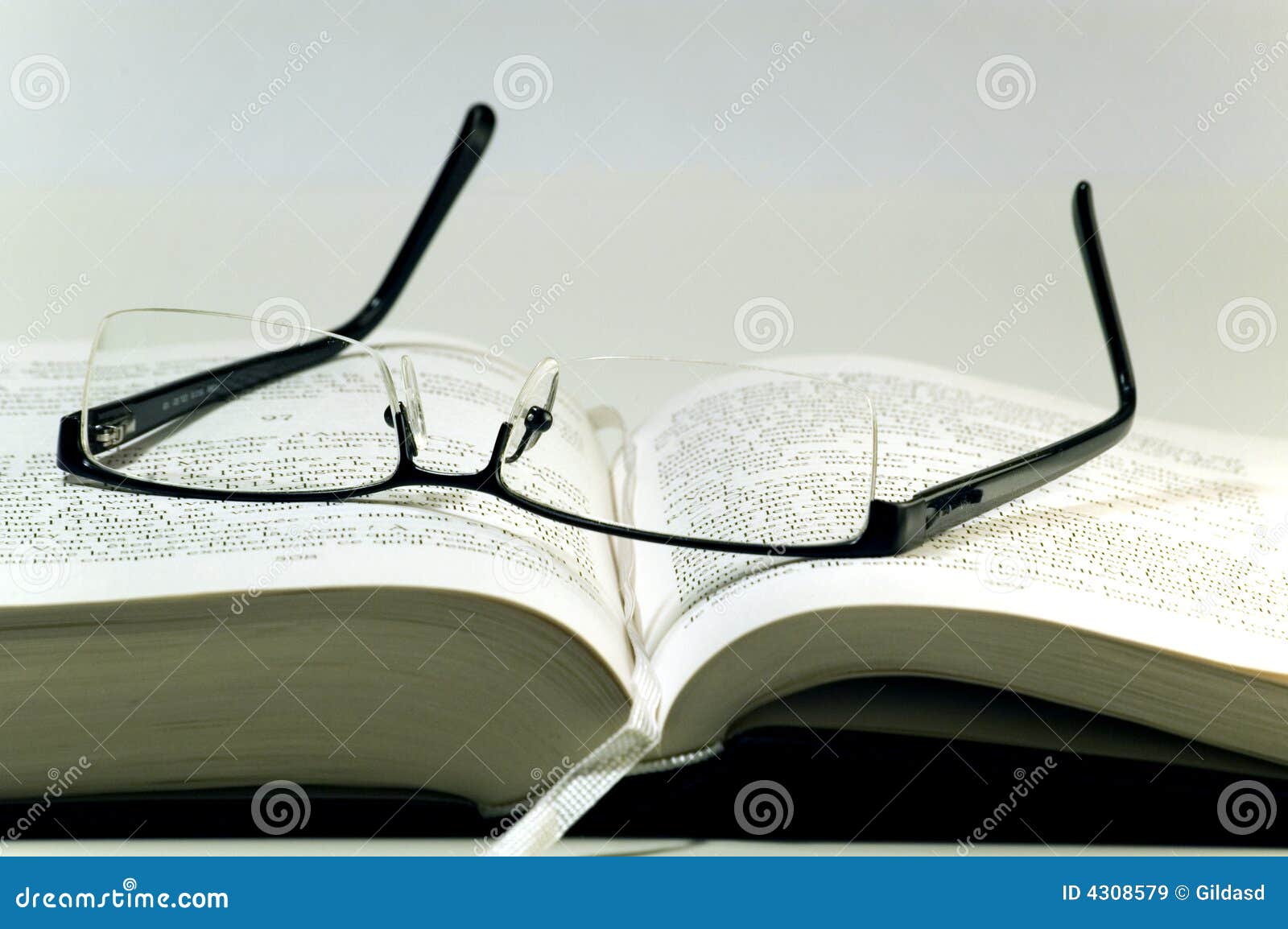 Glasses on a book stock image. Image of reading, read - 4308579
